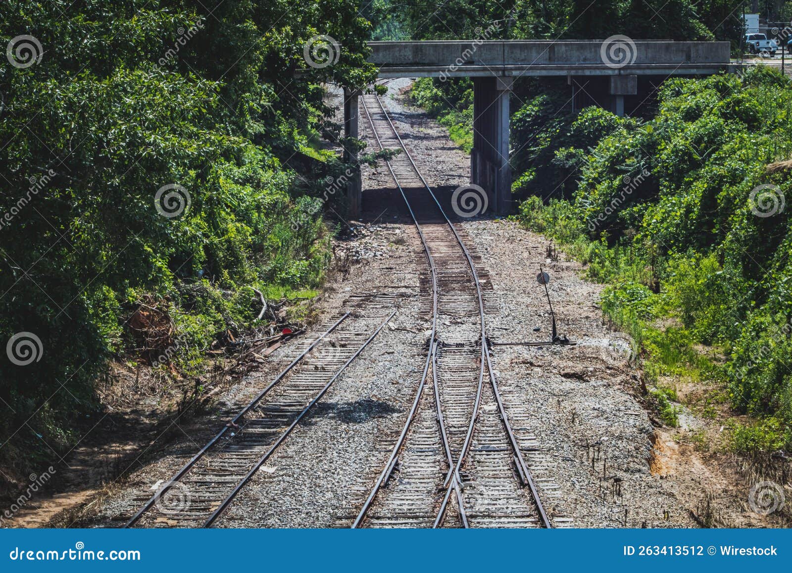 High-angle of Multiple Empty Railroad Tracks and a Bridge Trees Around ...