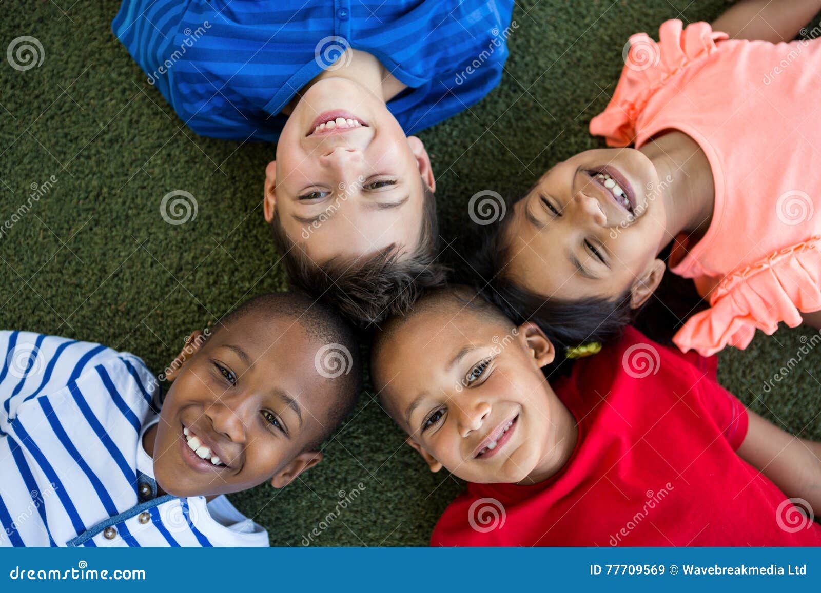 High Angle Portrait of Happy Children Forming Huddle Stock Image ...