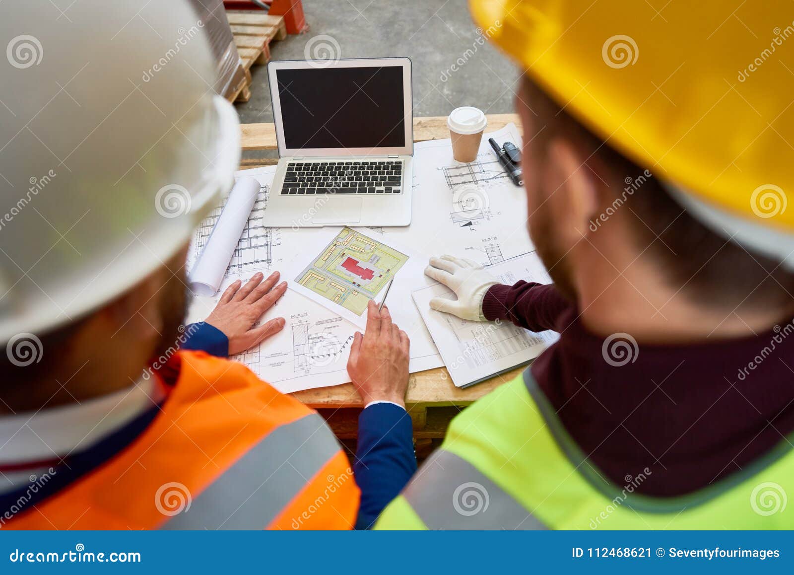 Construction Workers Looking at Plans Stock Image - Image of scheme ...