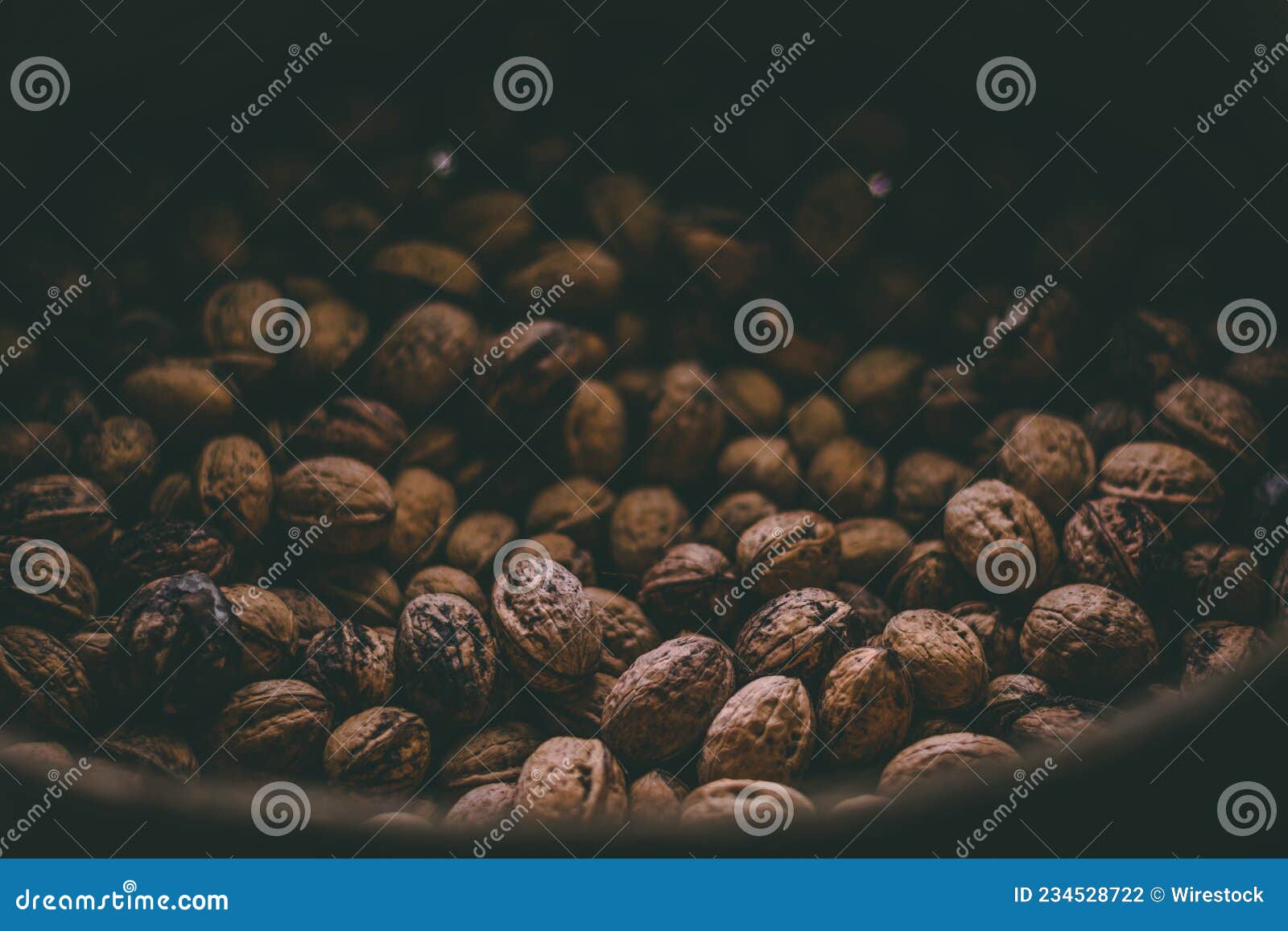 High Angle Selective Focus of Small Brown Nuts Under Light Stock Photo ...