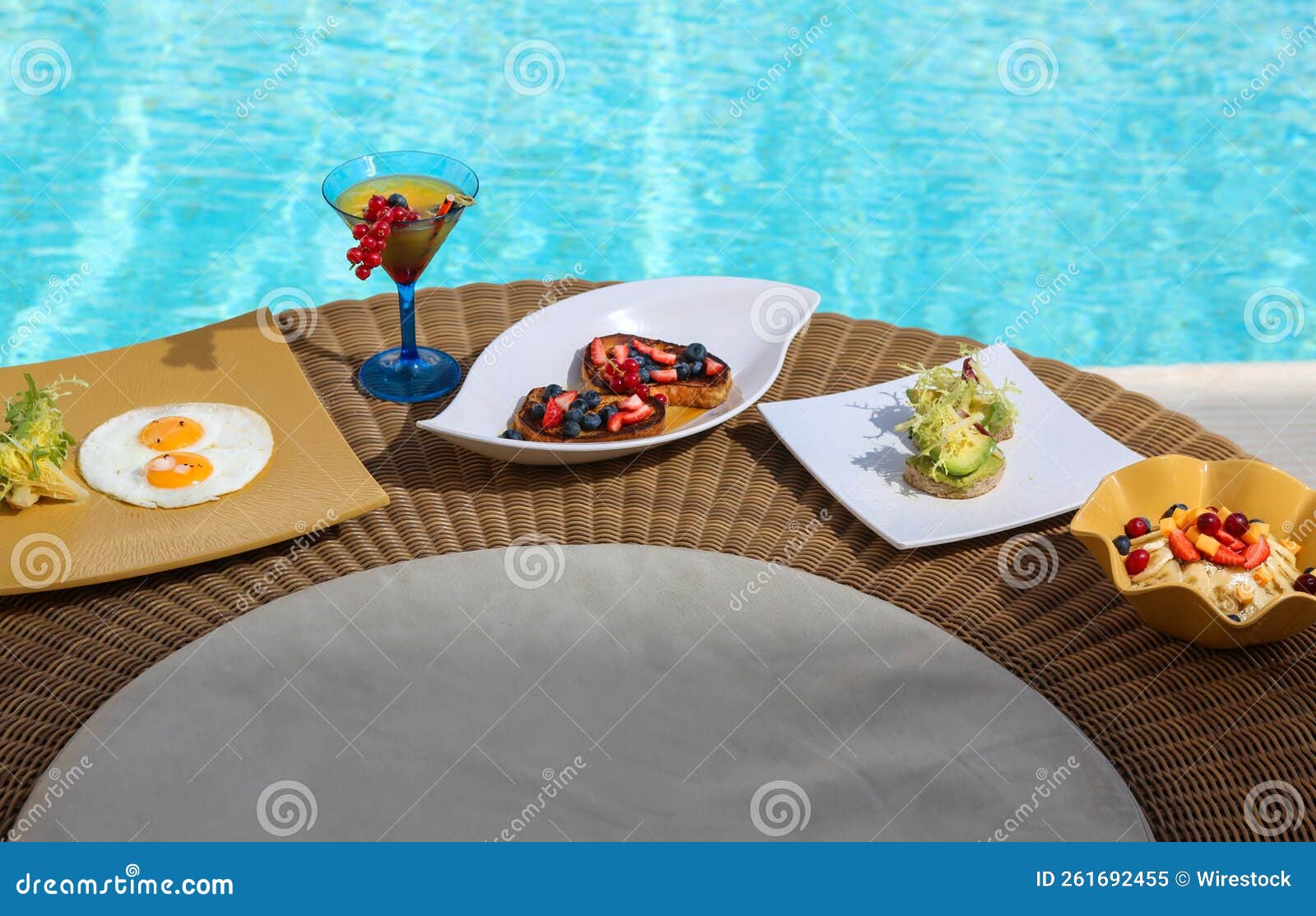 High Angle Shot of a Breakfast Table by the Pool. Stock Image - Image ...