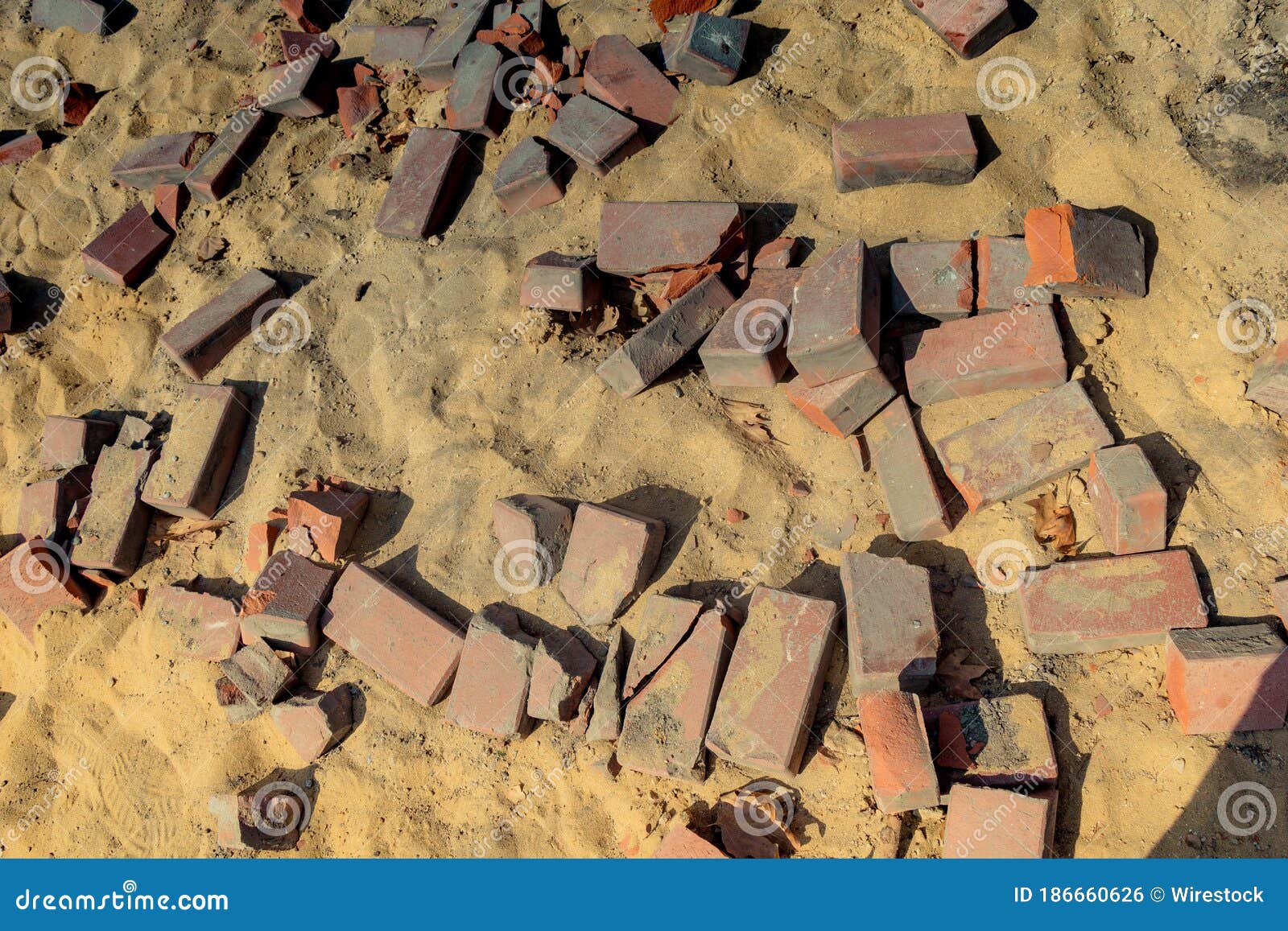 High Angle Shot of Broken Bricks on a Sandy Surface Stock Photo - Image ...