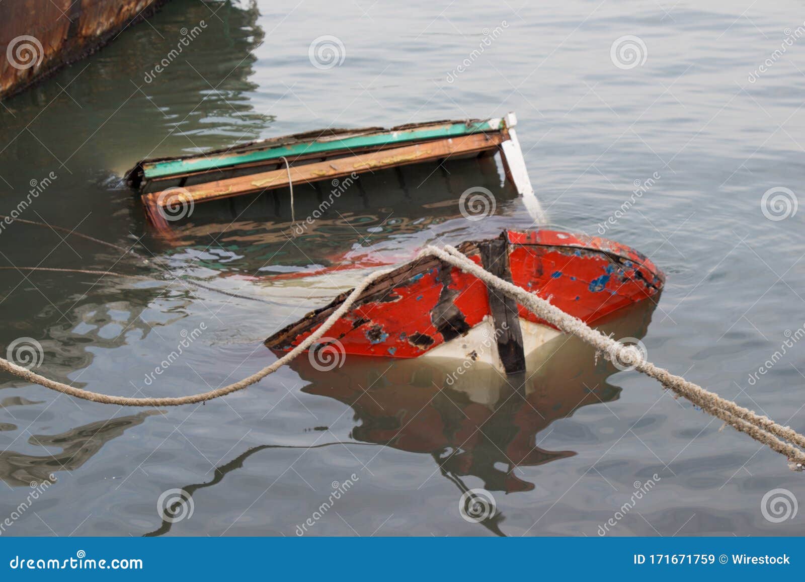 High Angle Shot of a Broken Sinking Sailboat in a River Stock Image ...