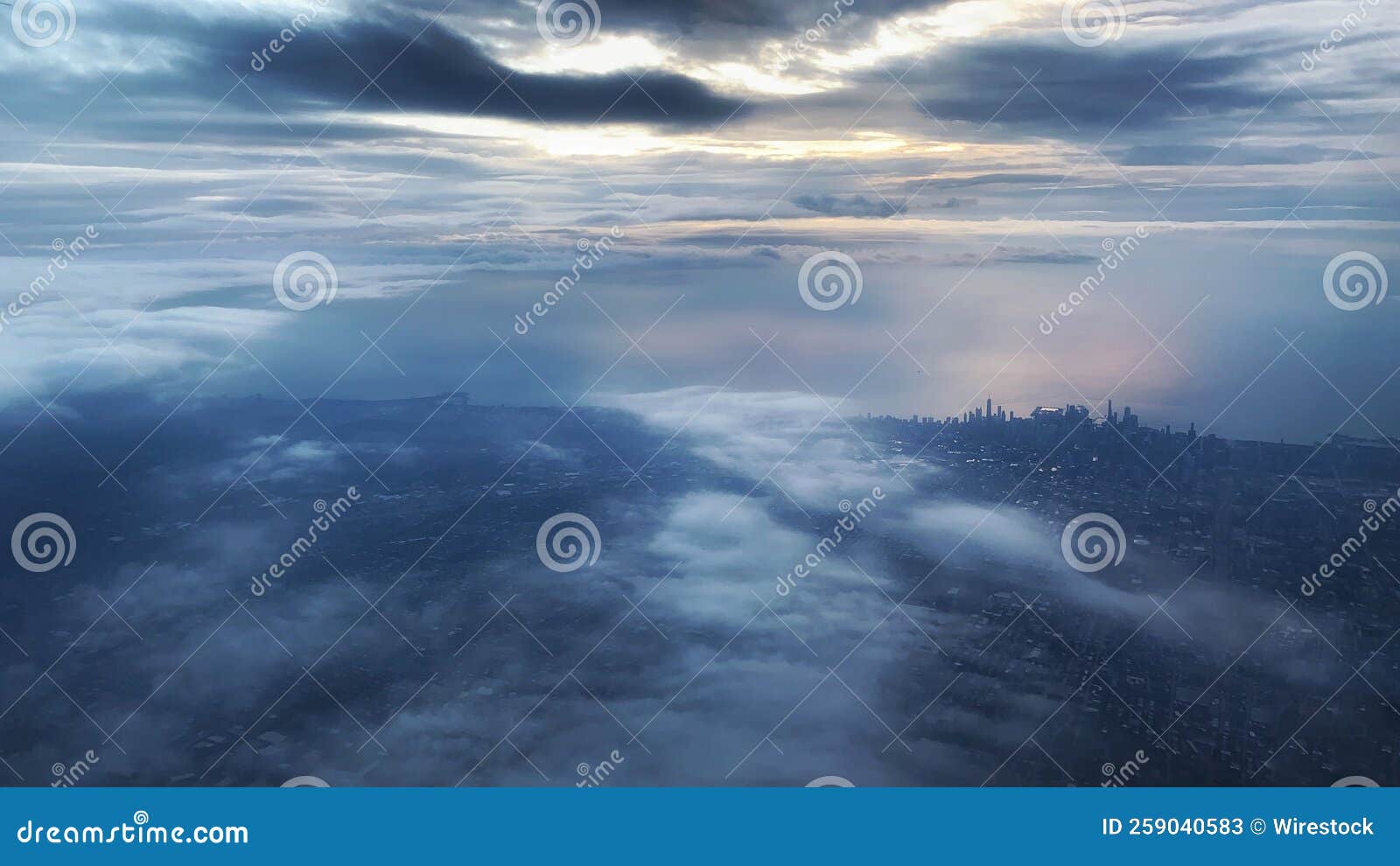 High Angle Shot of a City Panorama Above the Clouds Stock Image - Image ...