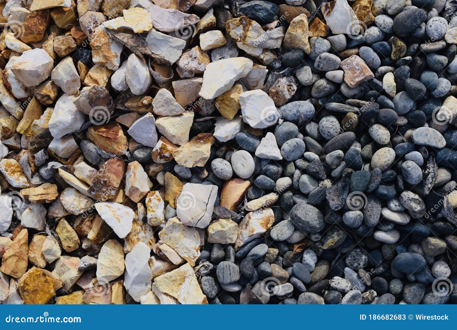 High Angle Shot of the Contrast of Light and Dark Textured Stones Stock ...