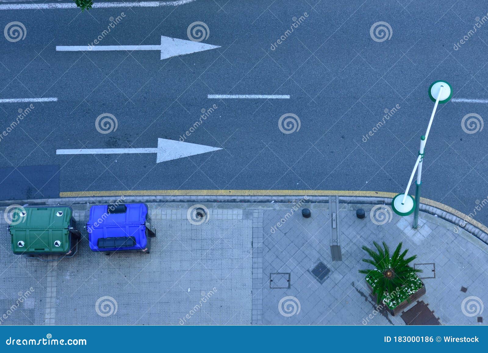 High Angle Shot of the Corner of the Sidewalk and the Asphalt Street ...