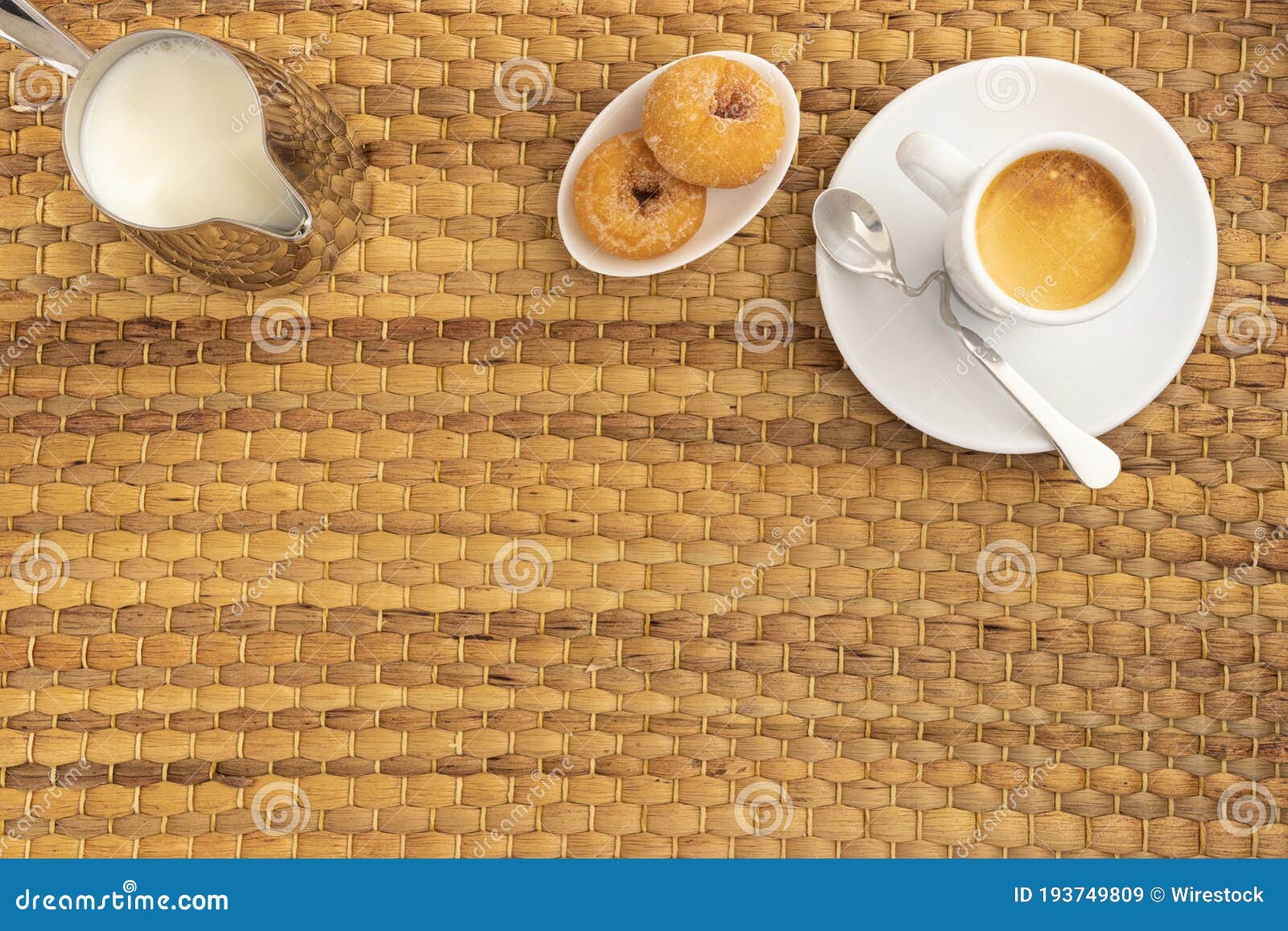 High Angle Shot of a Cup of Coffee, Donuts, and a Pitcher of Milk on a ...