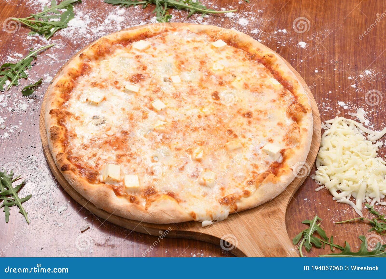 High Angle Shot of a Delicious Cheese Pizza on a Messy Kitchen Table ...