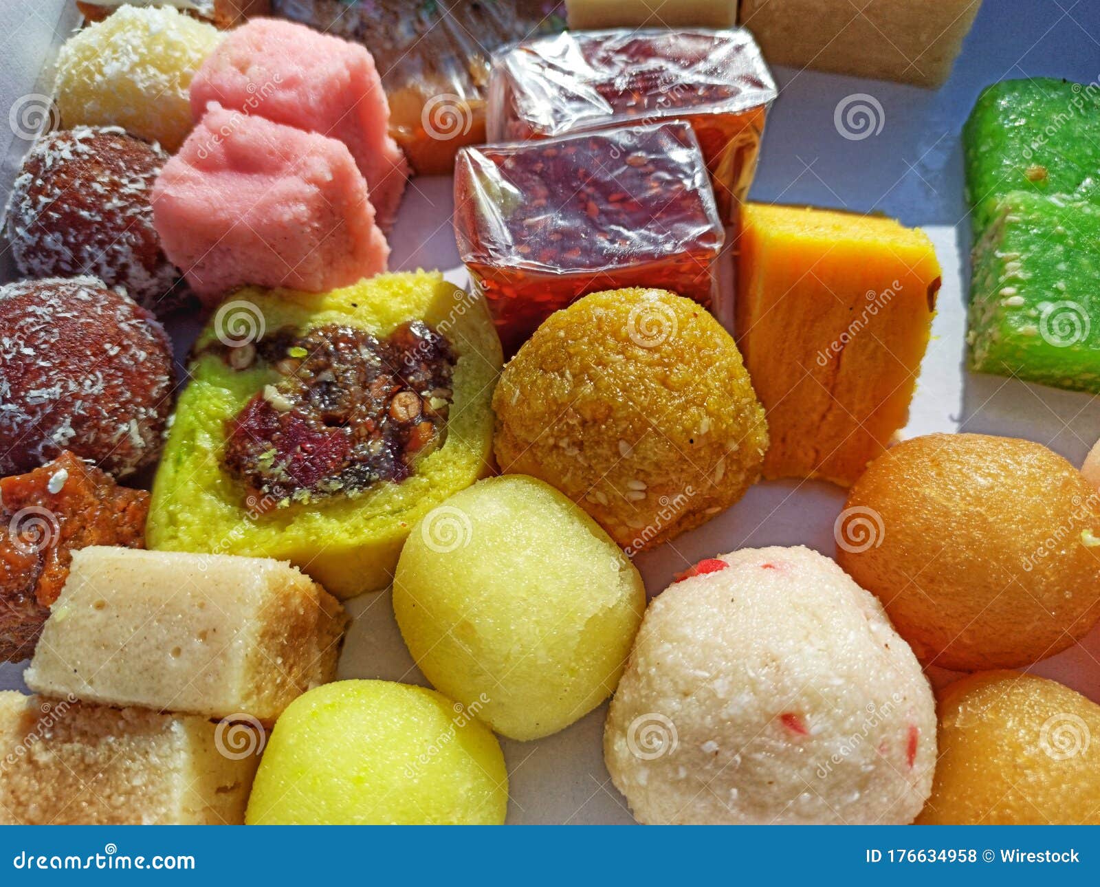 High Angle Shot of Different Types of Sweets of Various Colors on a ...