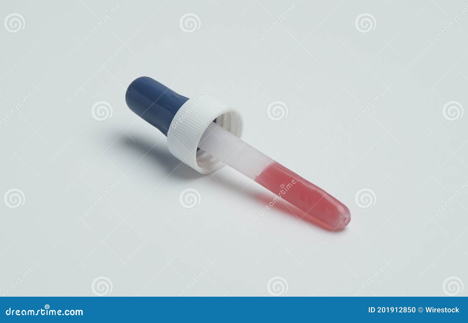 High Angle Shot of a Dropper on a White Surface Stock Photo - Image of ...