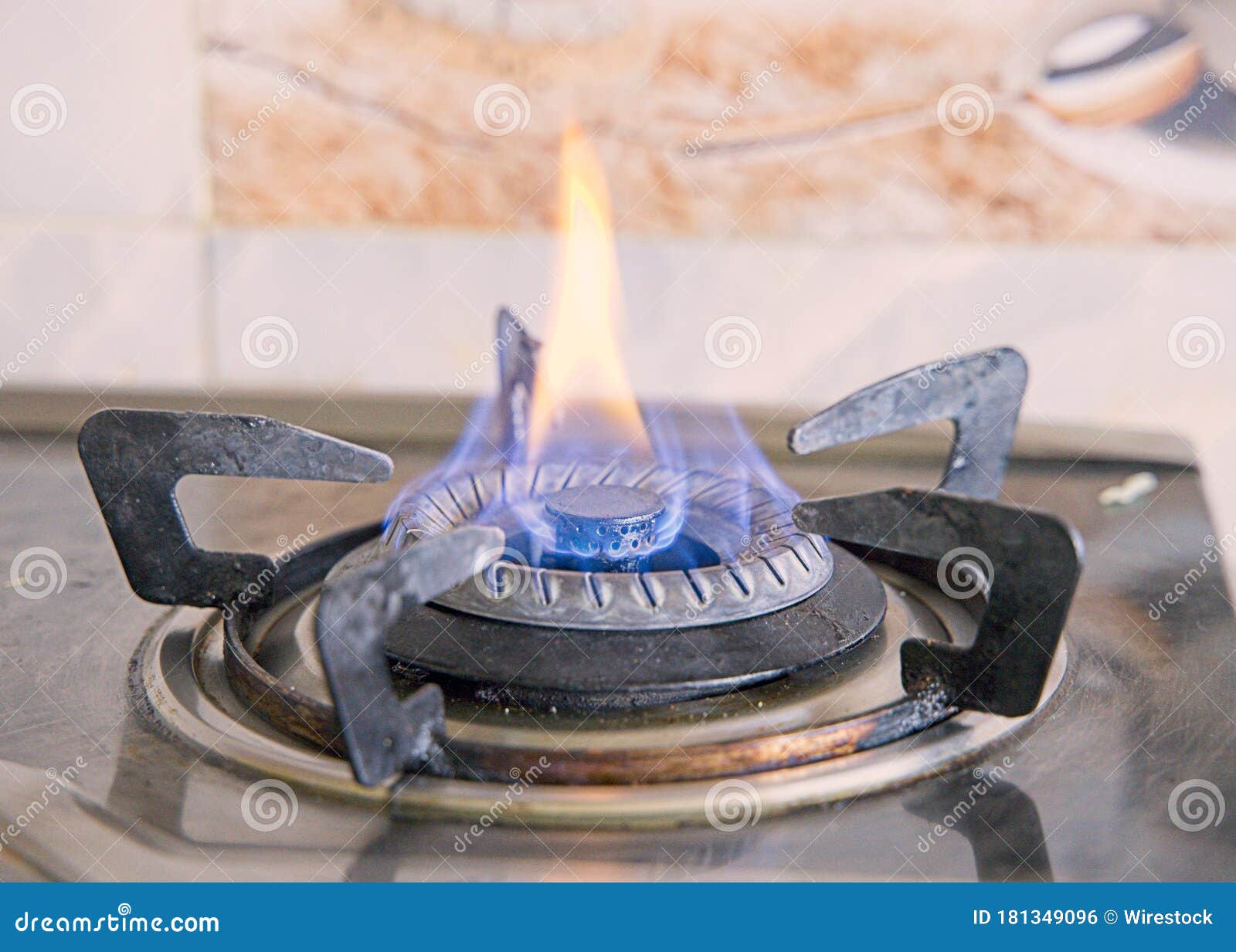 High Angle Shot of the Flames of Fire on a Metal Stove in a Kitchen ...