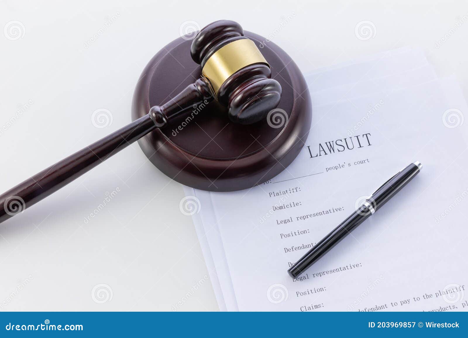 High Angle Shot of a Gavel and Lawsuit Papers on a White Surface Stock ...