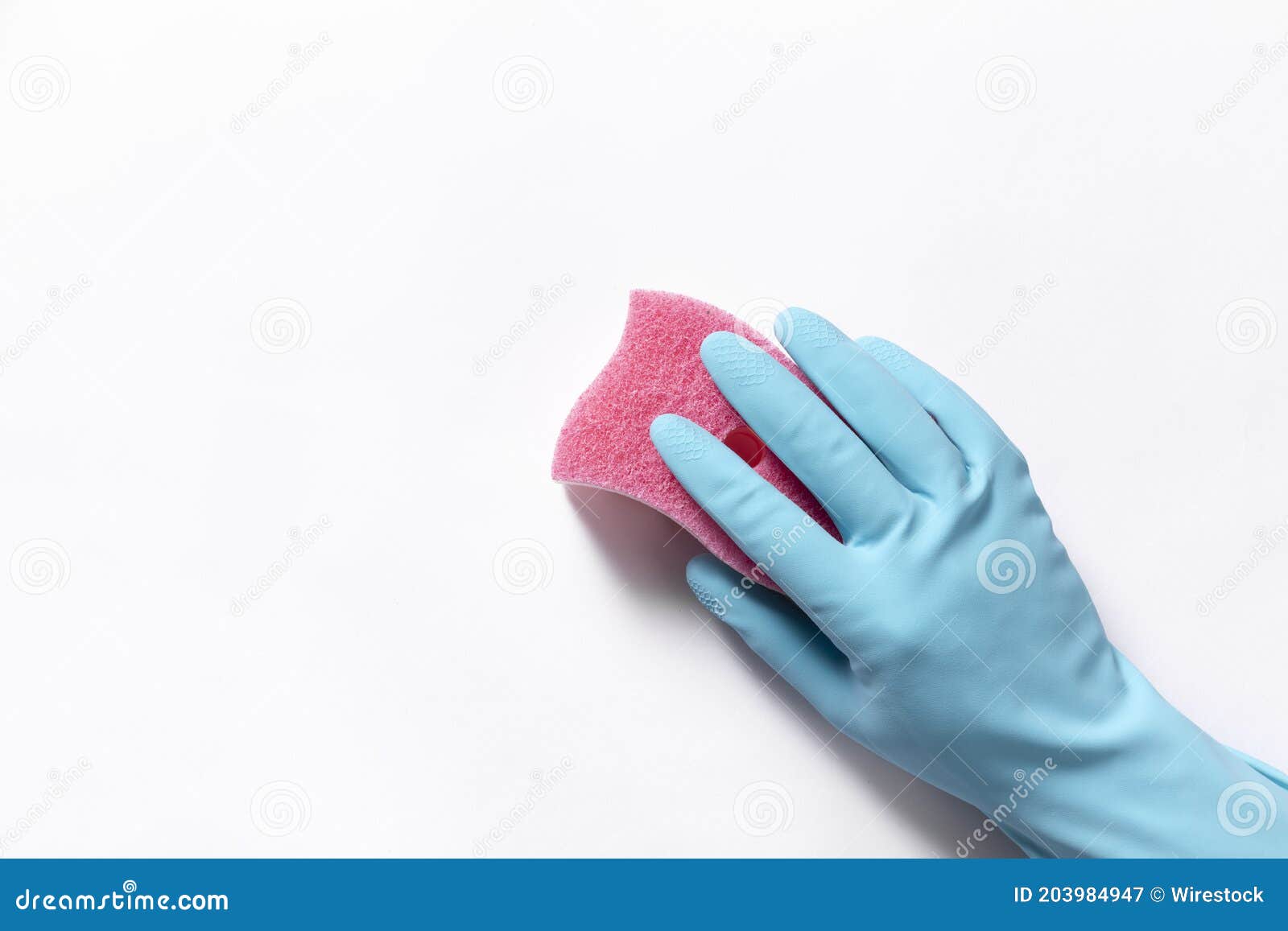 High Angle Shot of a Gloved Hand Cleaning a Surface with a Sponge Stock ...