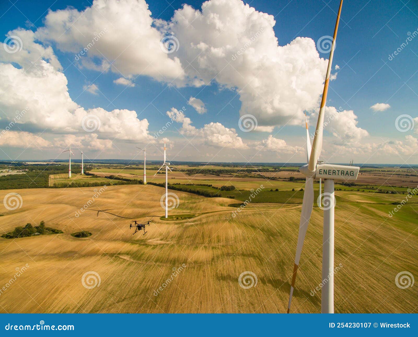 High-angle Shot of a Golden Field with Wind Turbines Stock Image ...