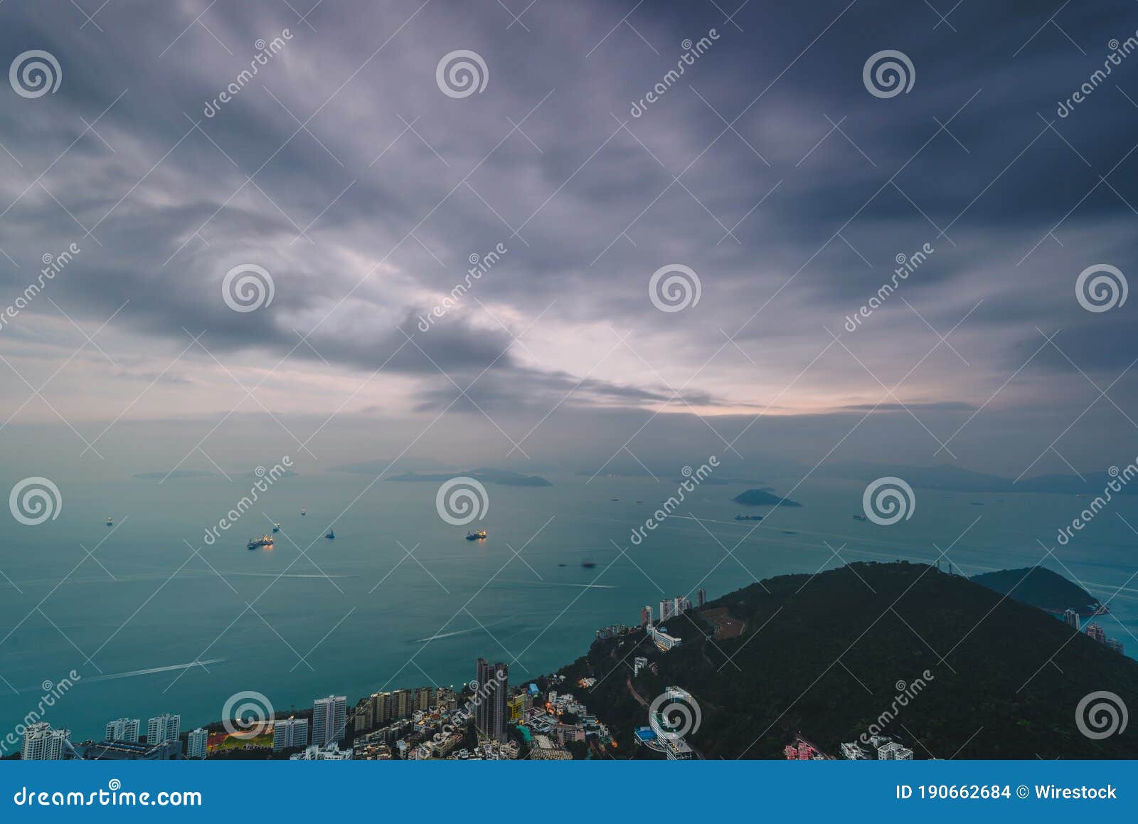 High Angle Shot of the Harbor by the Beautiful Ocean Under the Dull ...