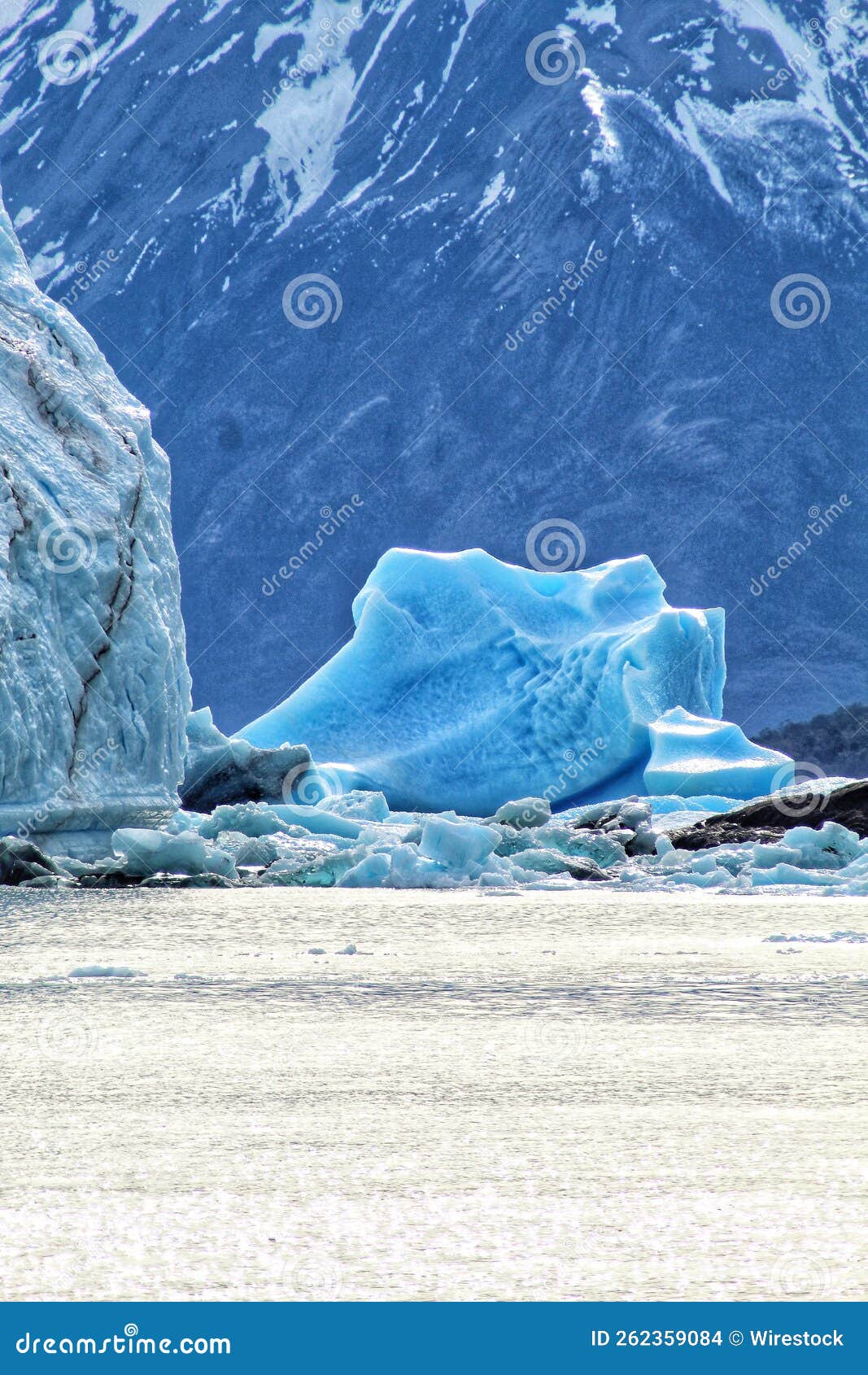 High Angle Shot of Lambert Glacier with Rocky Land in the Foreground ...