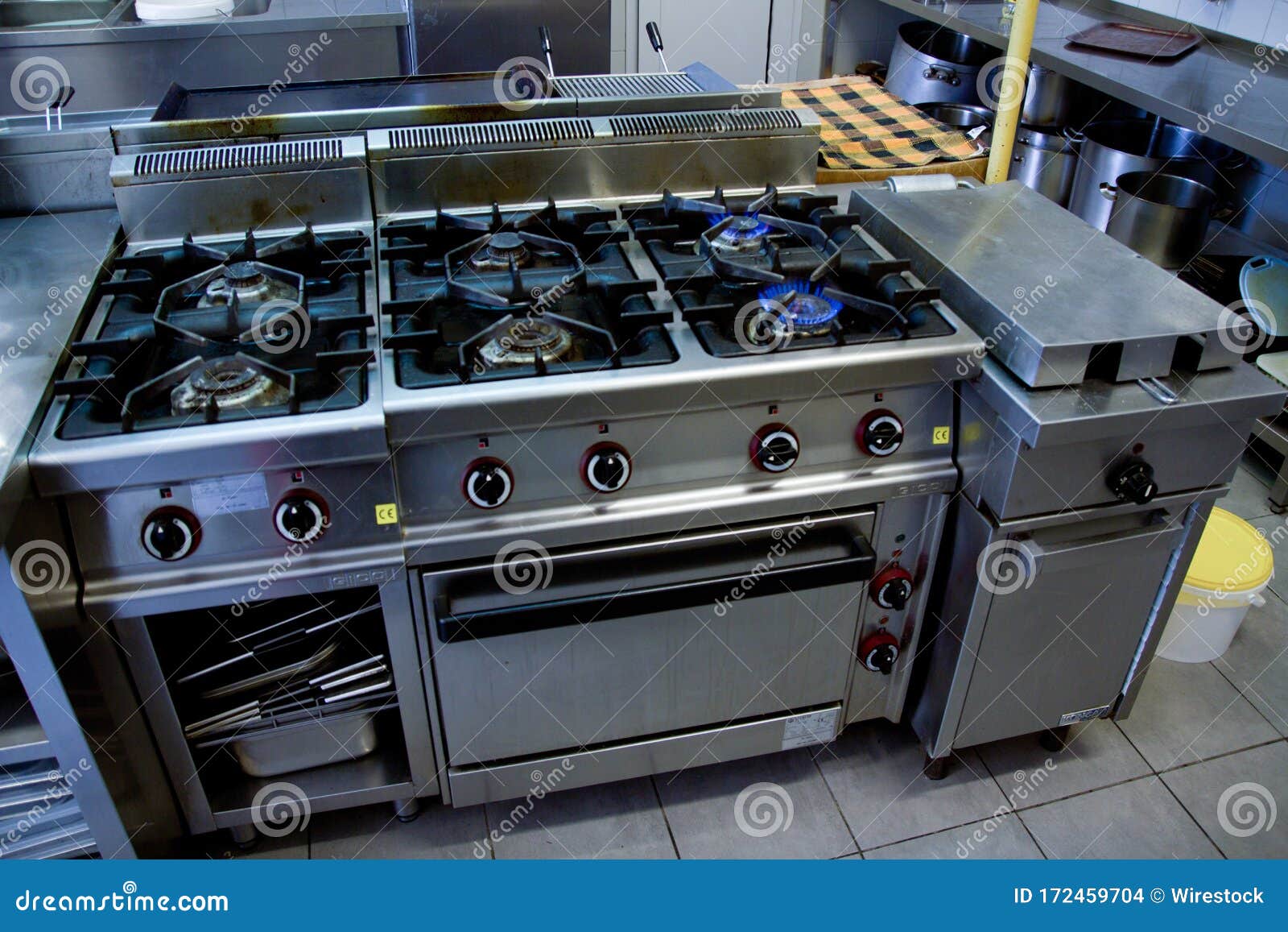 High Angle Shot of a Large Kitchen Stove with Blue Flames Stock Photo ...