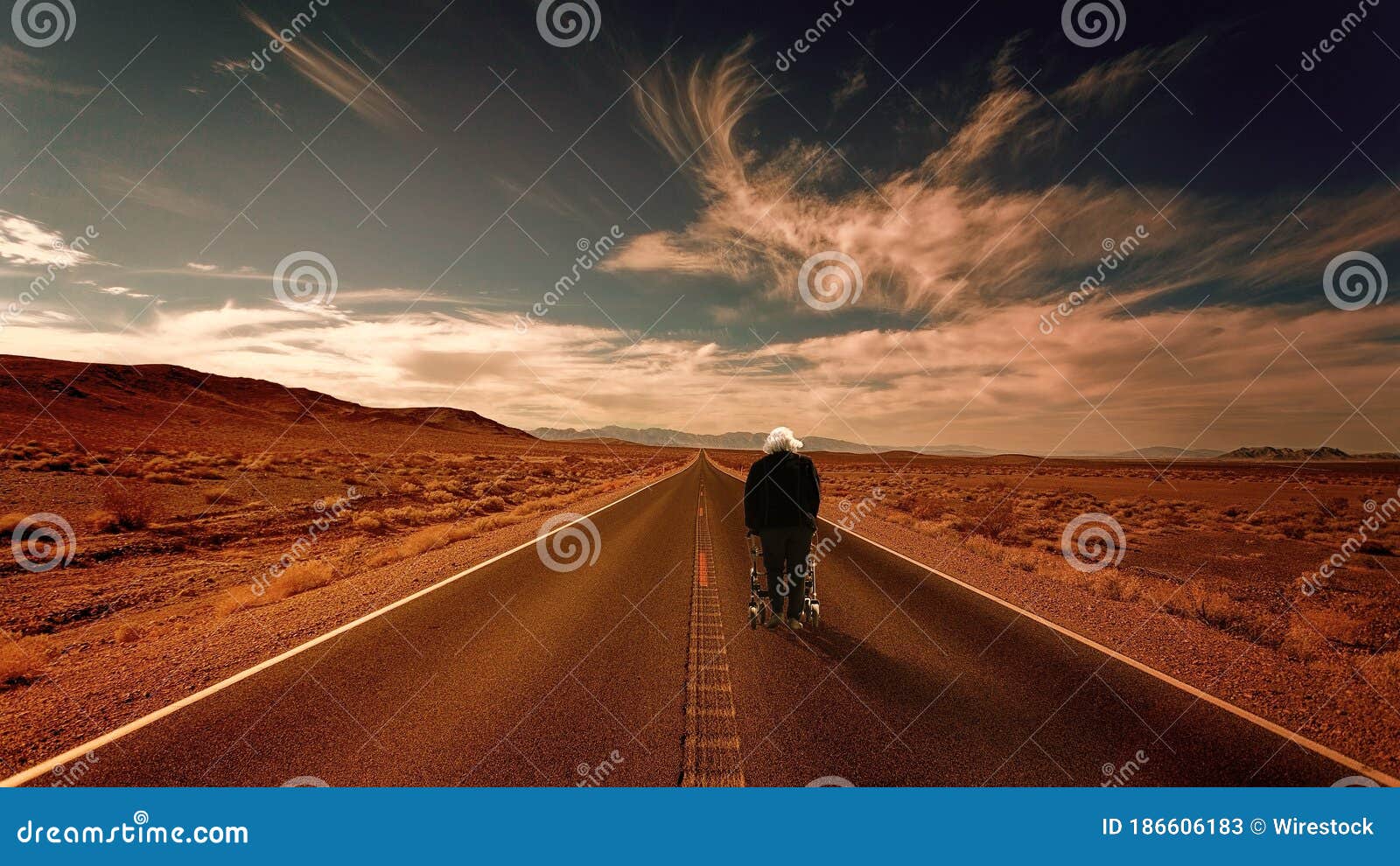 High Angle Shot on an Old Man Walking on an Empty Road Surrounded by a ...