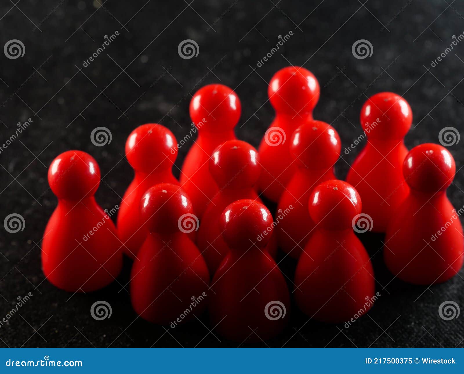 High Angle Shot of Red Board Game Figures on a Black Surface Stock ...
