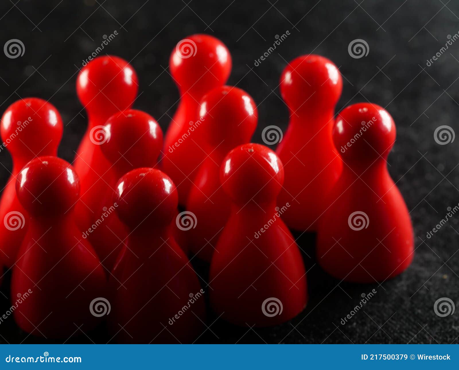 High Angle Shot of Red Board Game Figures on a Black Surface Stock ...