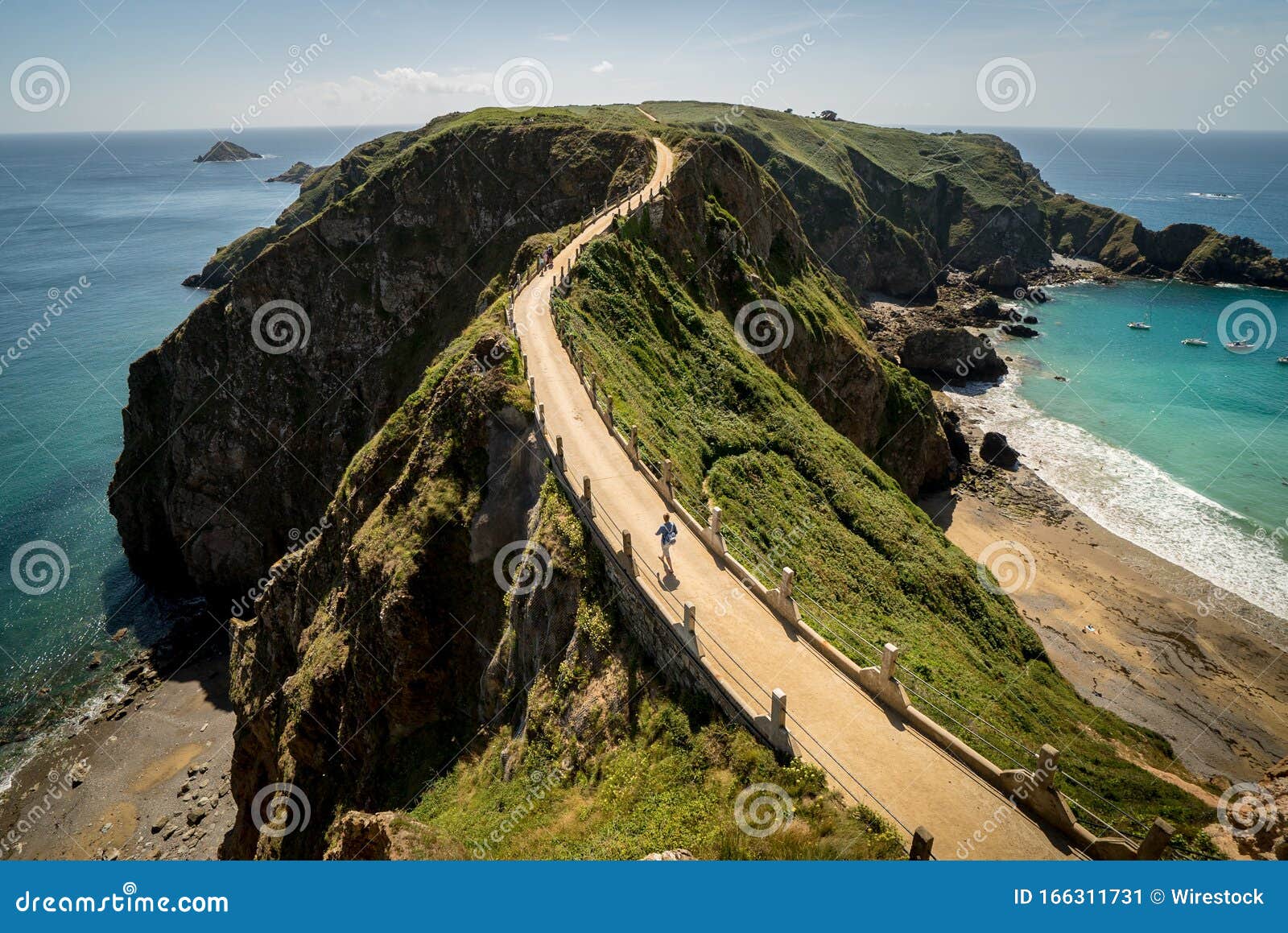 High Angle Shot of a Road on the Cliffs Over the Ocean Captured on the ...