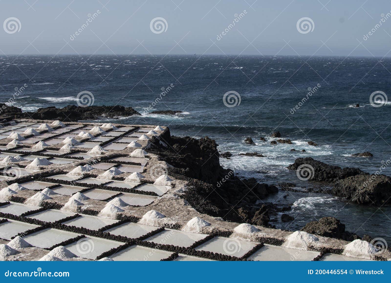 High Angle Shot of a Salt Mine Near a Beach Stock Photo - Image of dark ...