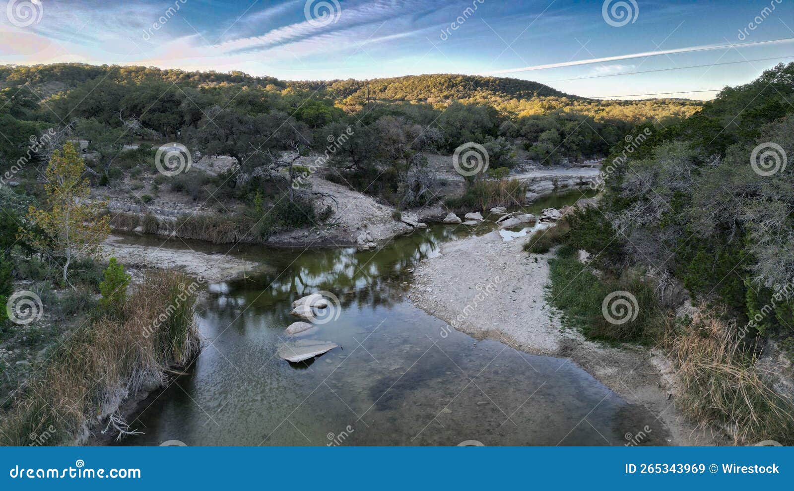 High-angle Shot of a Shallow and Rocky River Surrounded by Vegetation ...