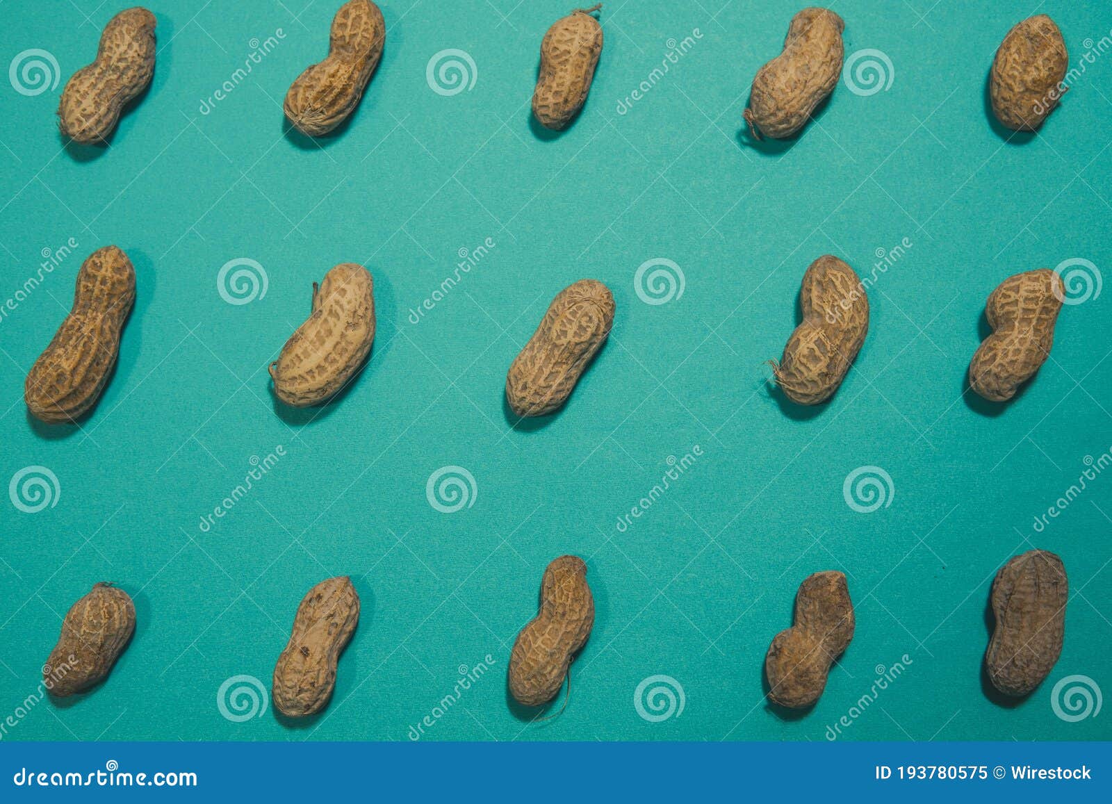 High Angle Shot of Some Delicious Peanut on a Blue Surface Stock Image ...