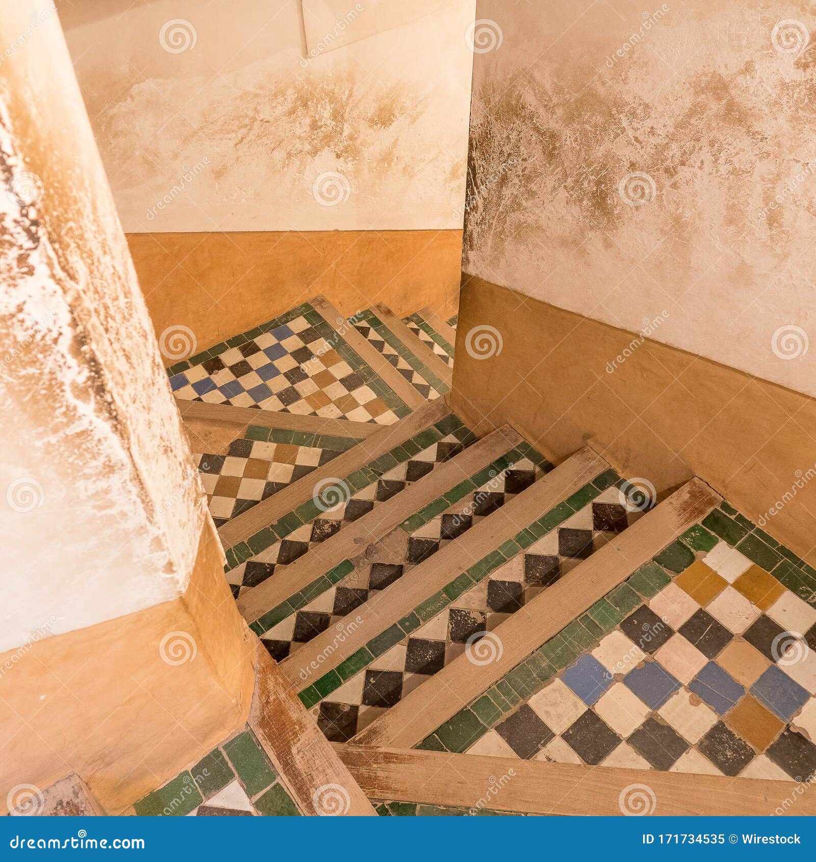 High Angle Shot of the Stairs Going Down with Multicolored Tiles on ...