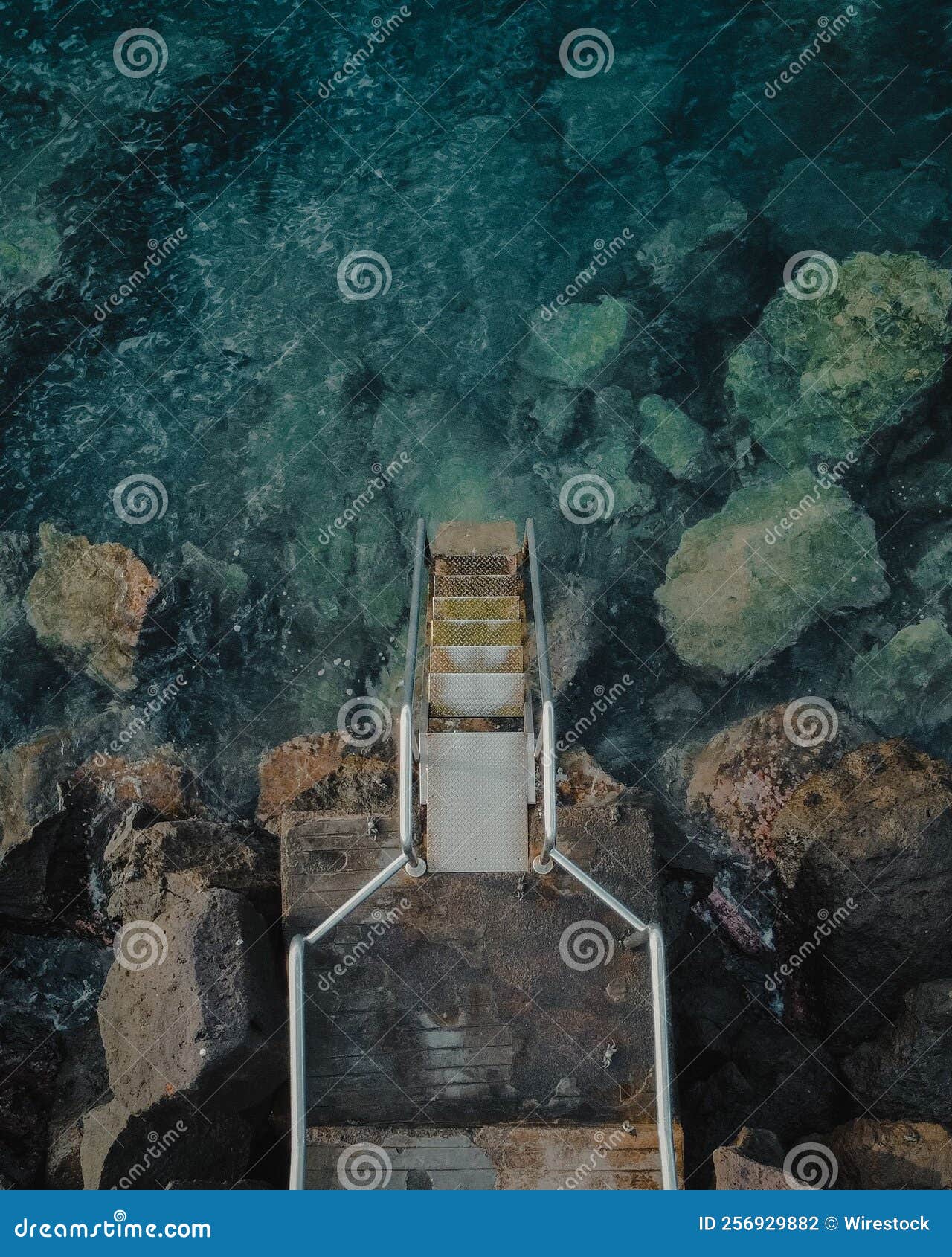 High-angle Shot of a Stairway Down To a Rocky Beach Stock Photo - Image ...