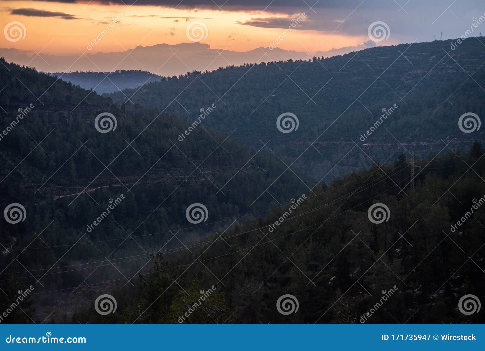 High Angle Shot of the Sunset in the Dark Sky Over the Mountains Stock ...