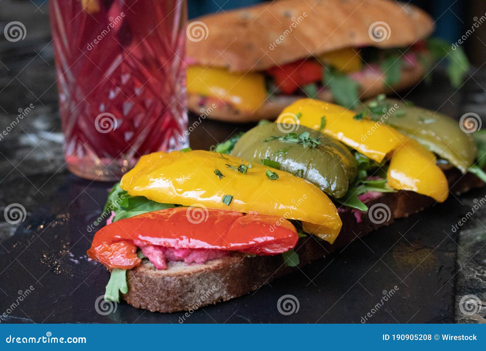 High Angle Shot of a Traditional Sandwich with Fresh Vegetables on a ...