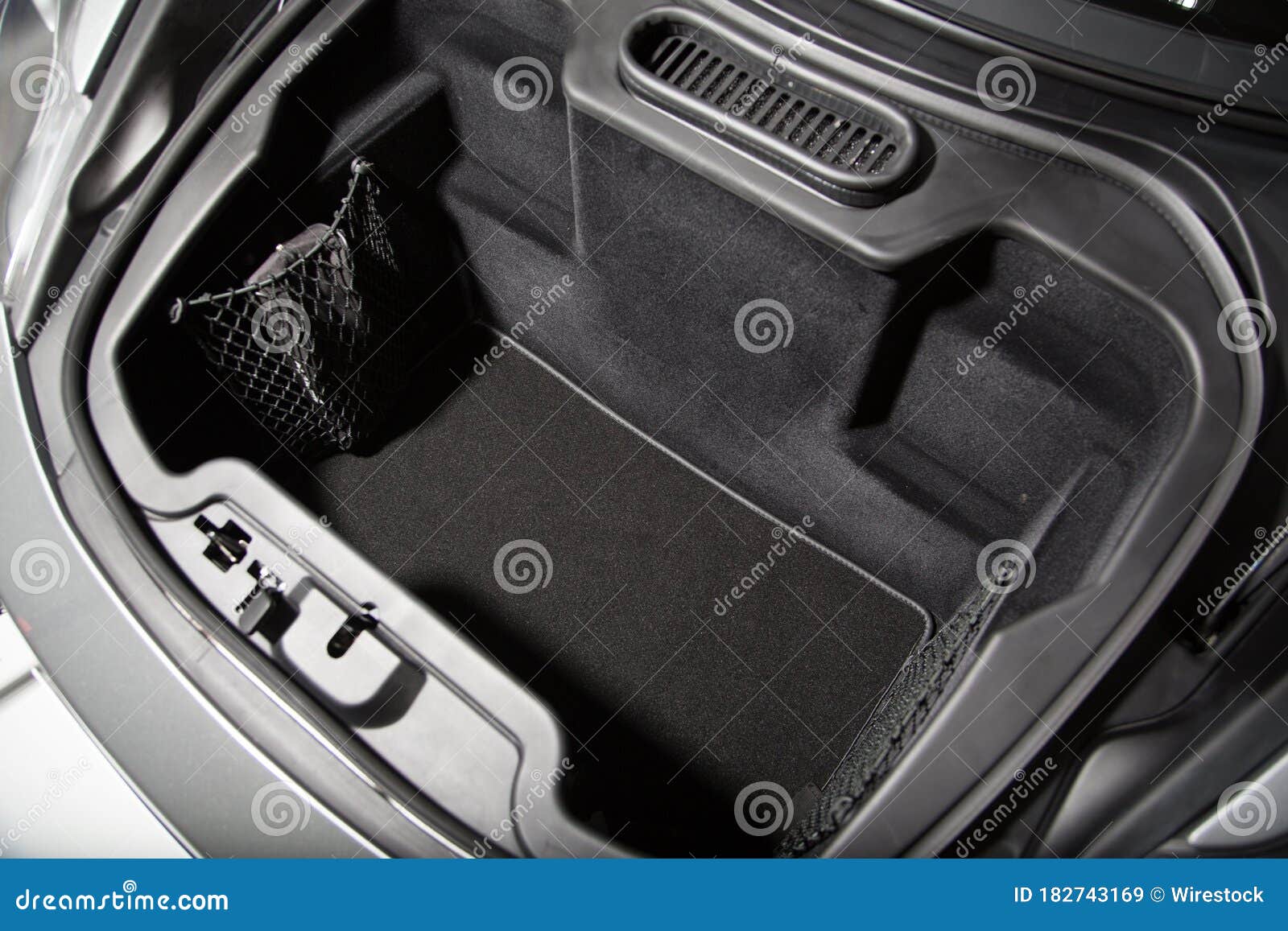 High Angle Shot of a Trunk of a Modern Luxury Car Under the Lights ...