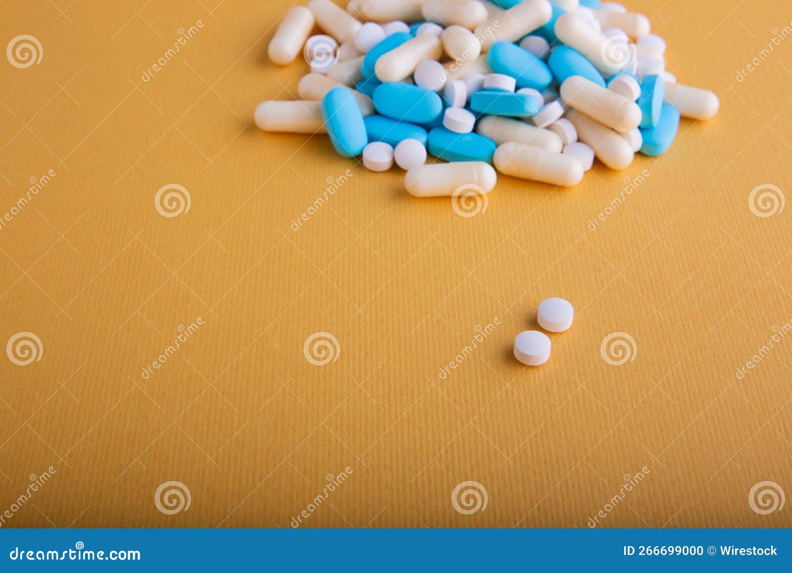 High-angle Shot of Two Medicines Separated from the Rest of the Oval ...