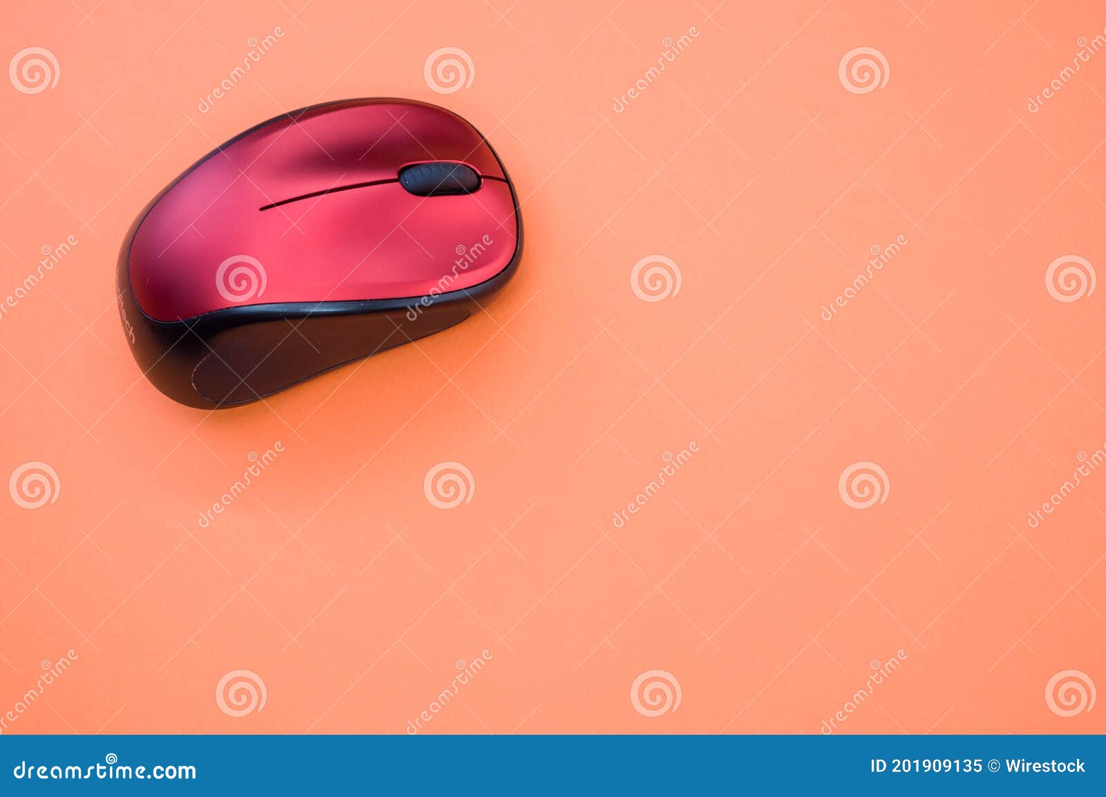 High Angle Shot of a Wireless Mouse on an Orange Surface Stock Image ...