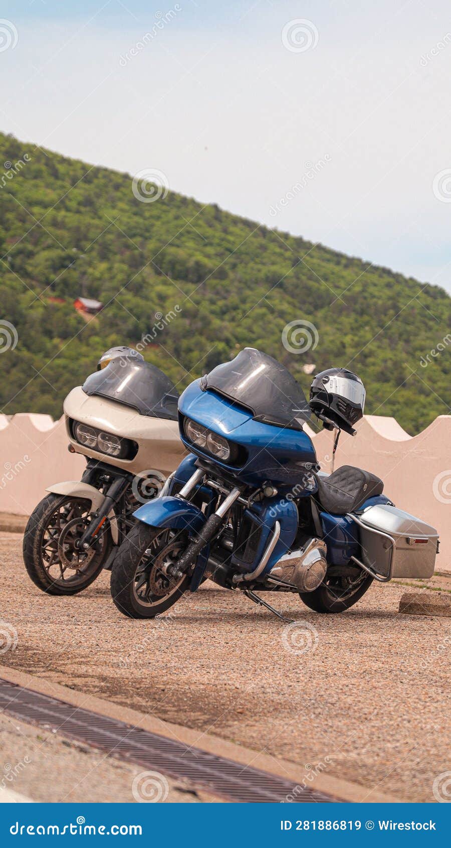 A Vertical Shot of Two Motorcycle on the Side of a Road Stock Image ...
