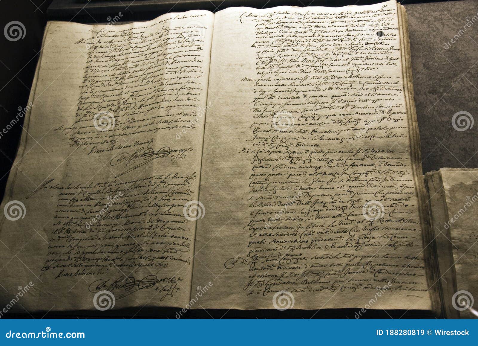 High Angle View of an Ancient Book with Handwritten Notes on the Table ...