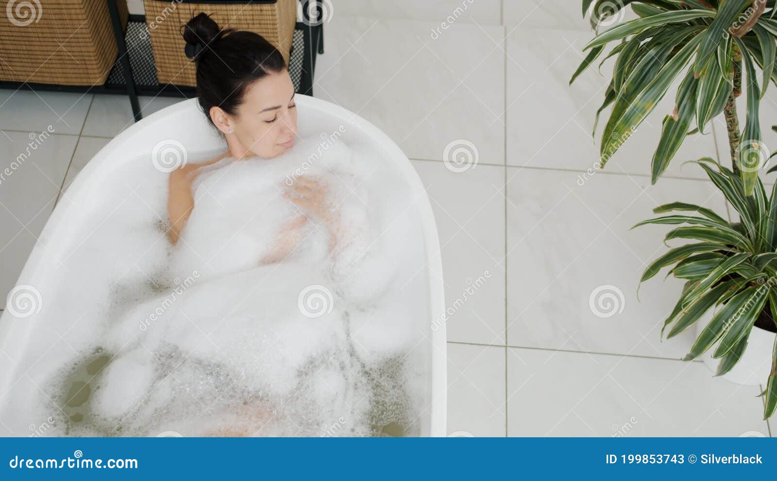 High Angle View Of Attractive Lady Lying In Bathtub Relaxing In Warm