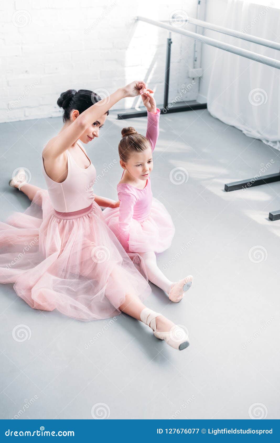 High Angle View of Ballet Teacher and Little Student Training Together ...