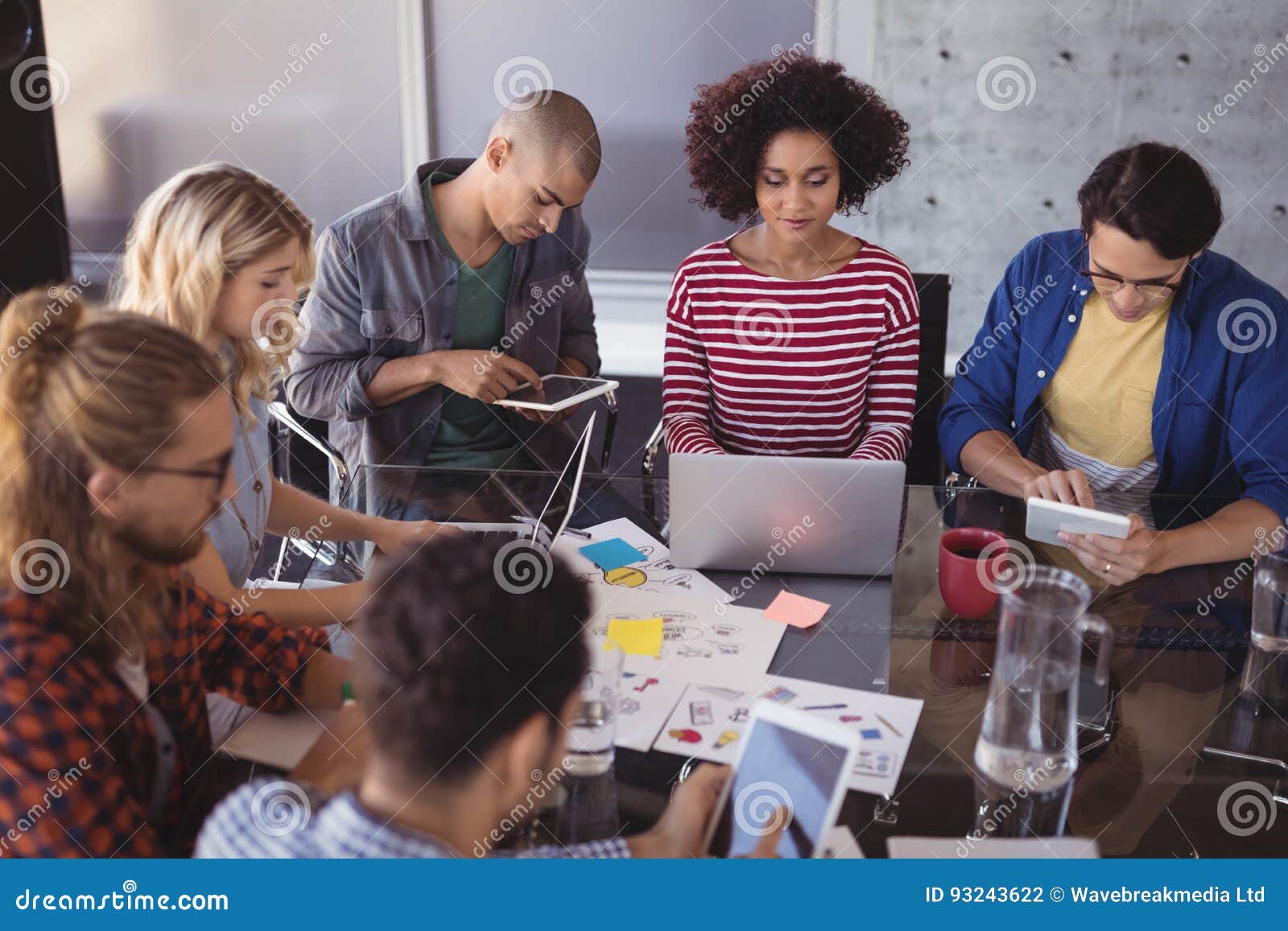 High Angle View of Business Team Working Together at Desk Stock Photo ...