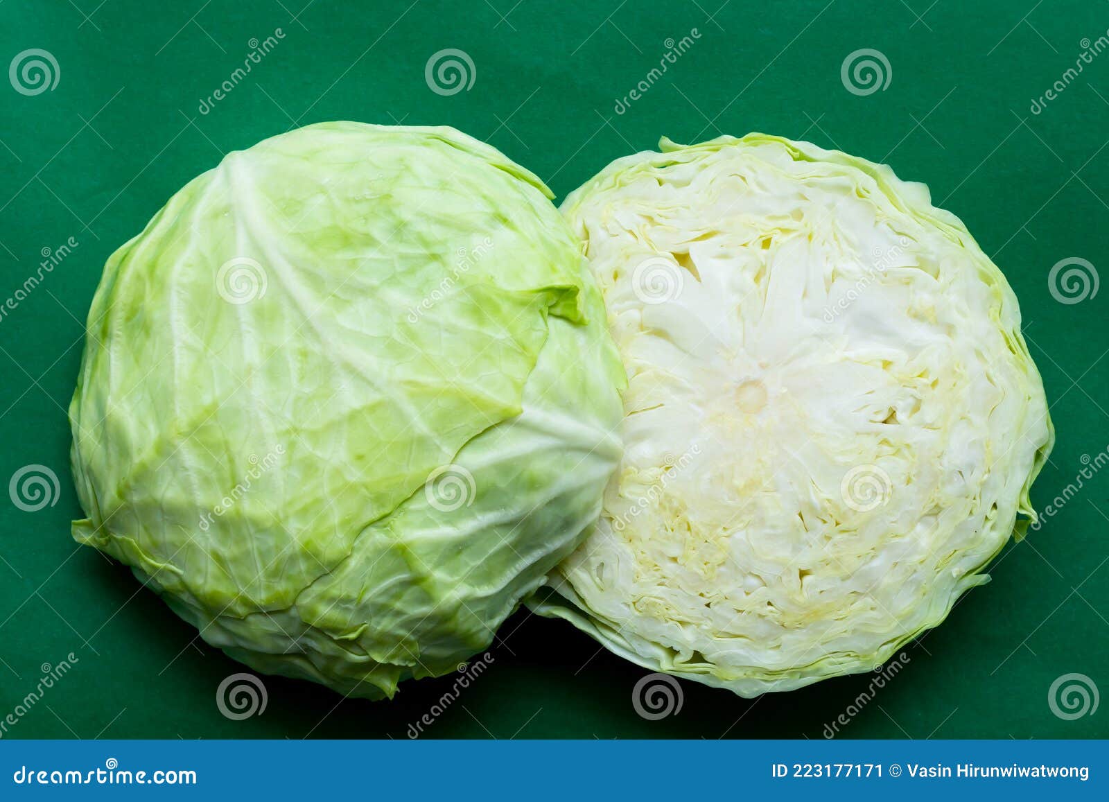High Angle View of Cabbage Cut in Half on Green Background Stock Image ...