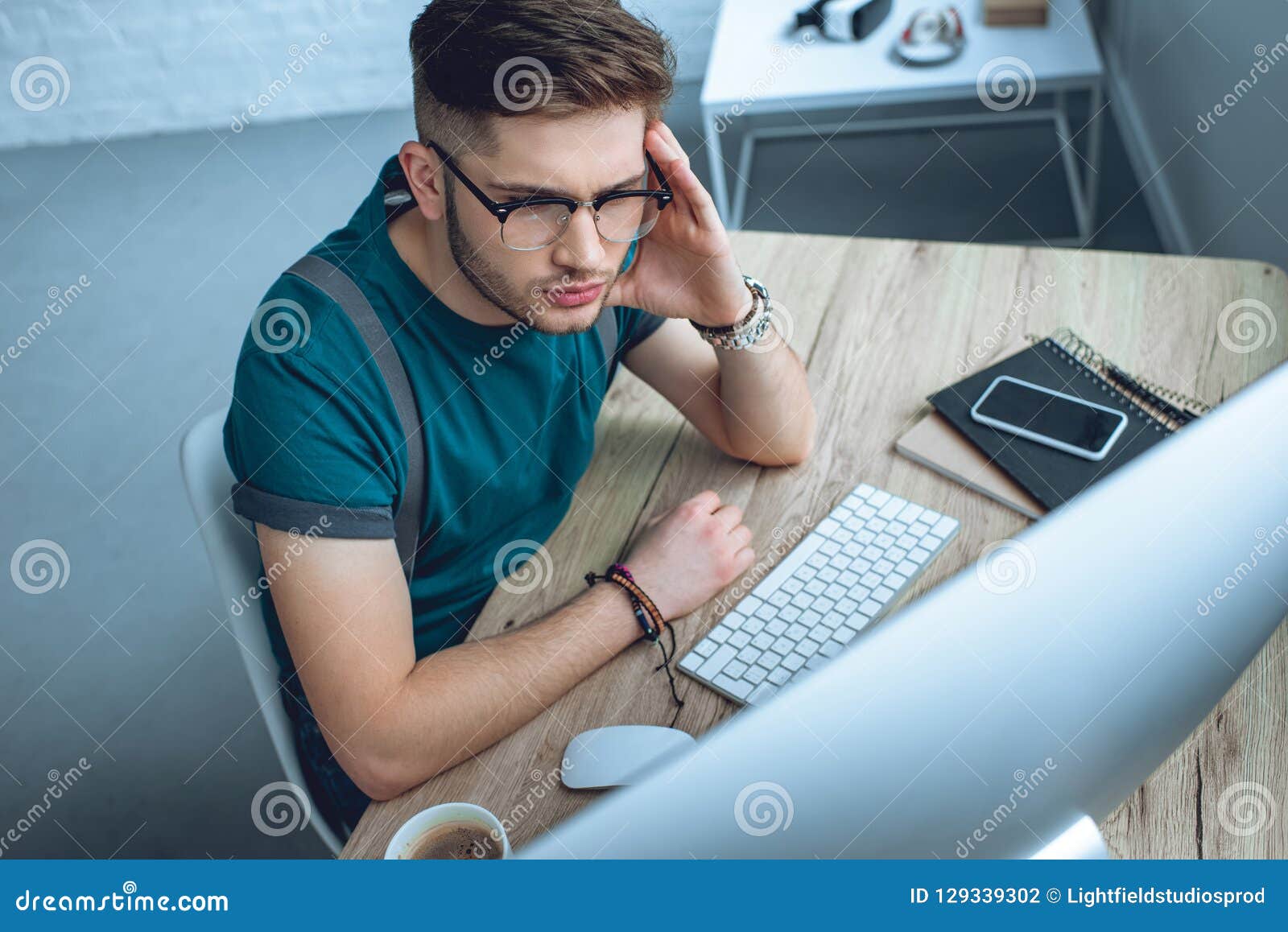 High Angle View of Concentrated Young Man Stock Photo - Image of ...