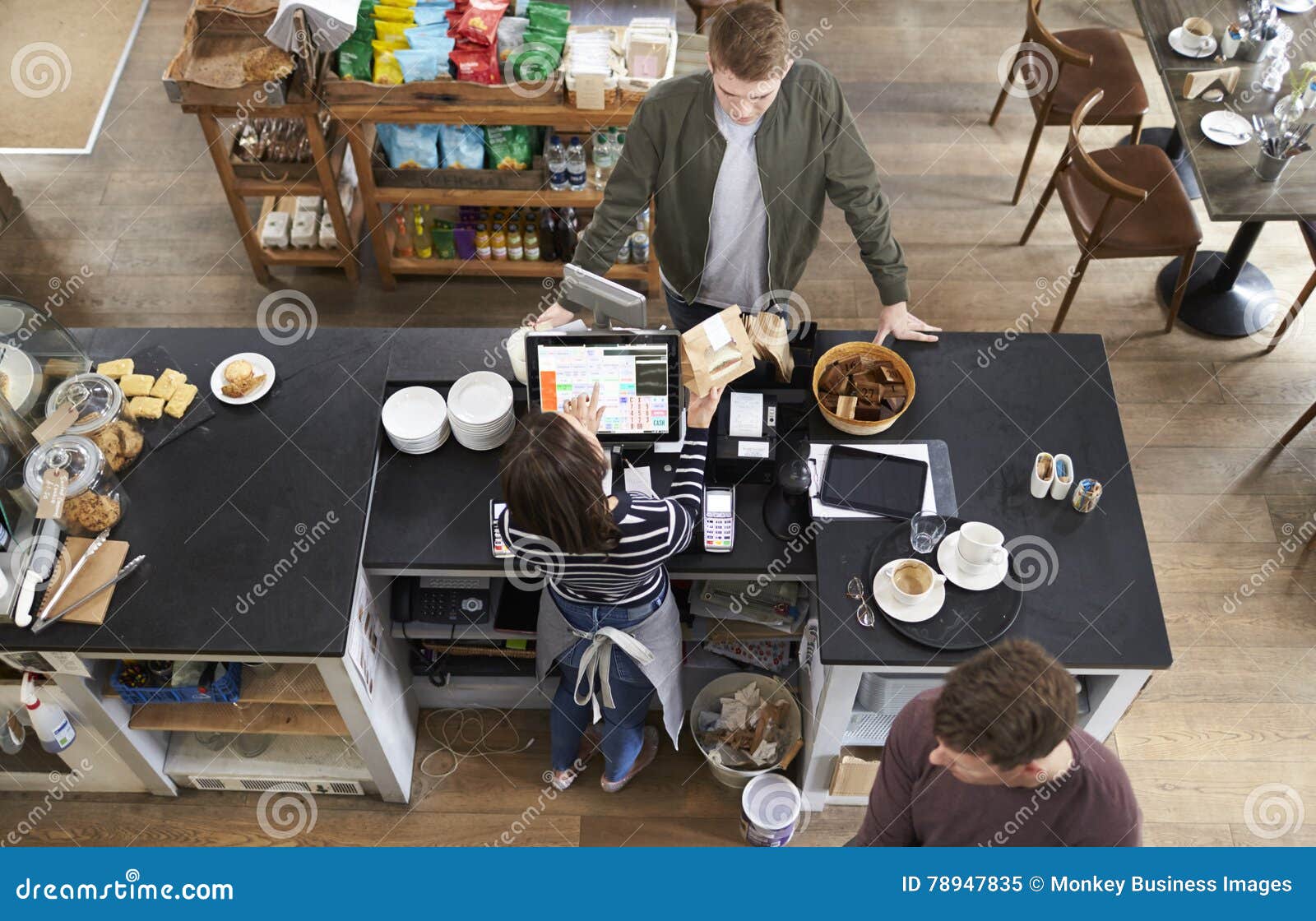 High Angle View of Customer at the Counter of a Coffee Shop Stock Image ...
