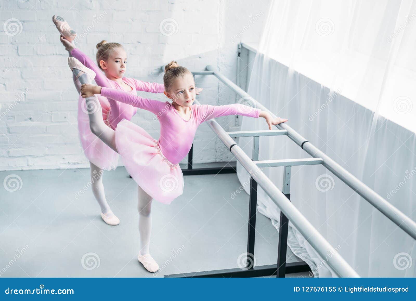 High Angle View of Cute Little Ballet Dancers Stretching Stock Image ...