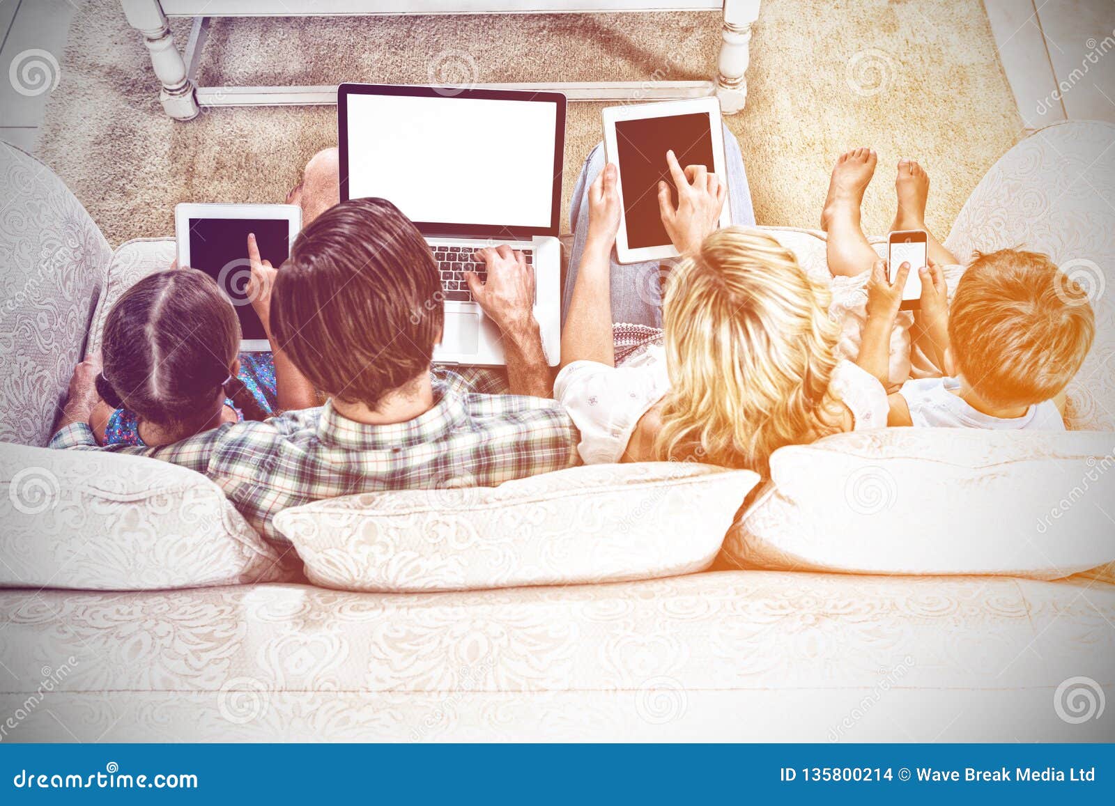 High Angle View of Family Using Technologies Stock Photo - Image of ...