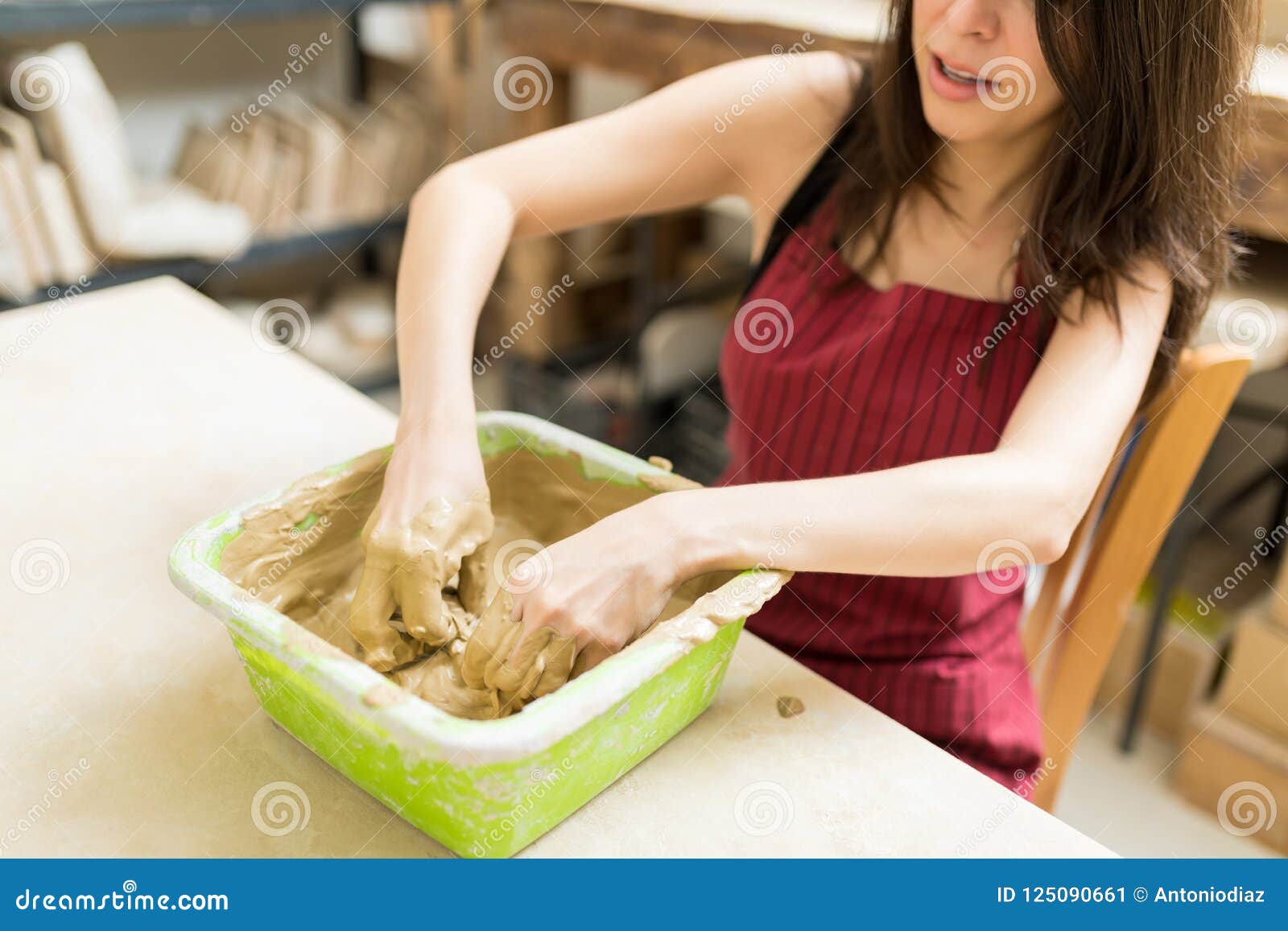 Entrepreneur Mixing Clay in Container at Pottery Workshop Stock Image ...