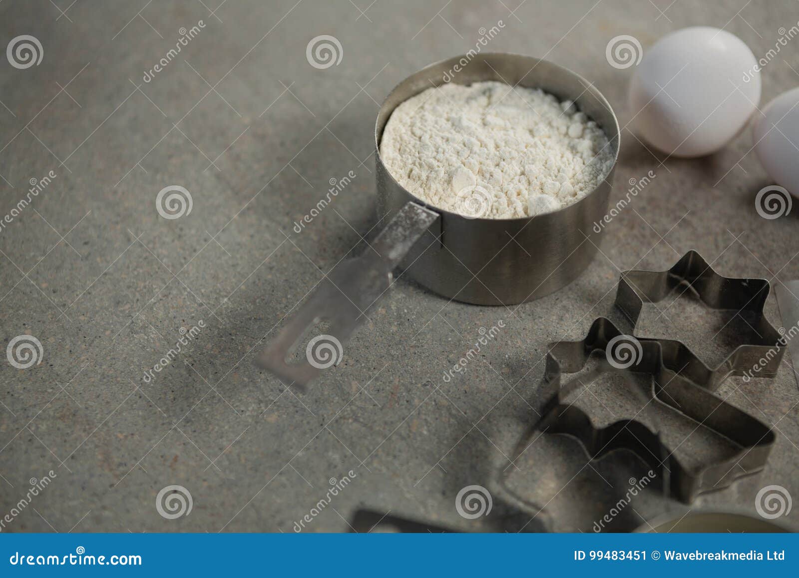 High Angle View of Flour in Container with Egg and Pastry Cutters Stock ...