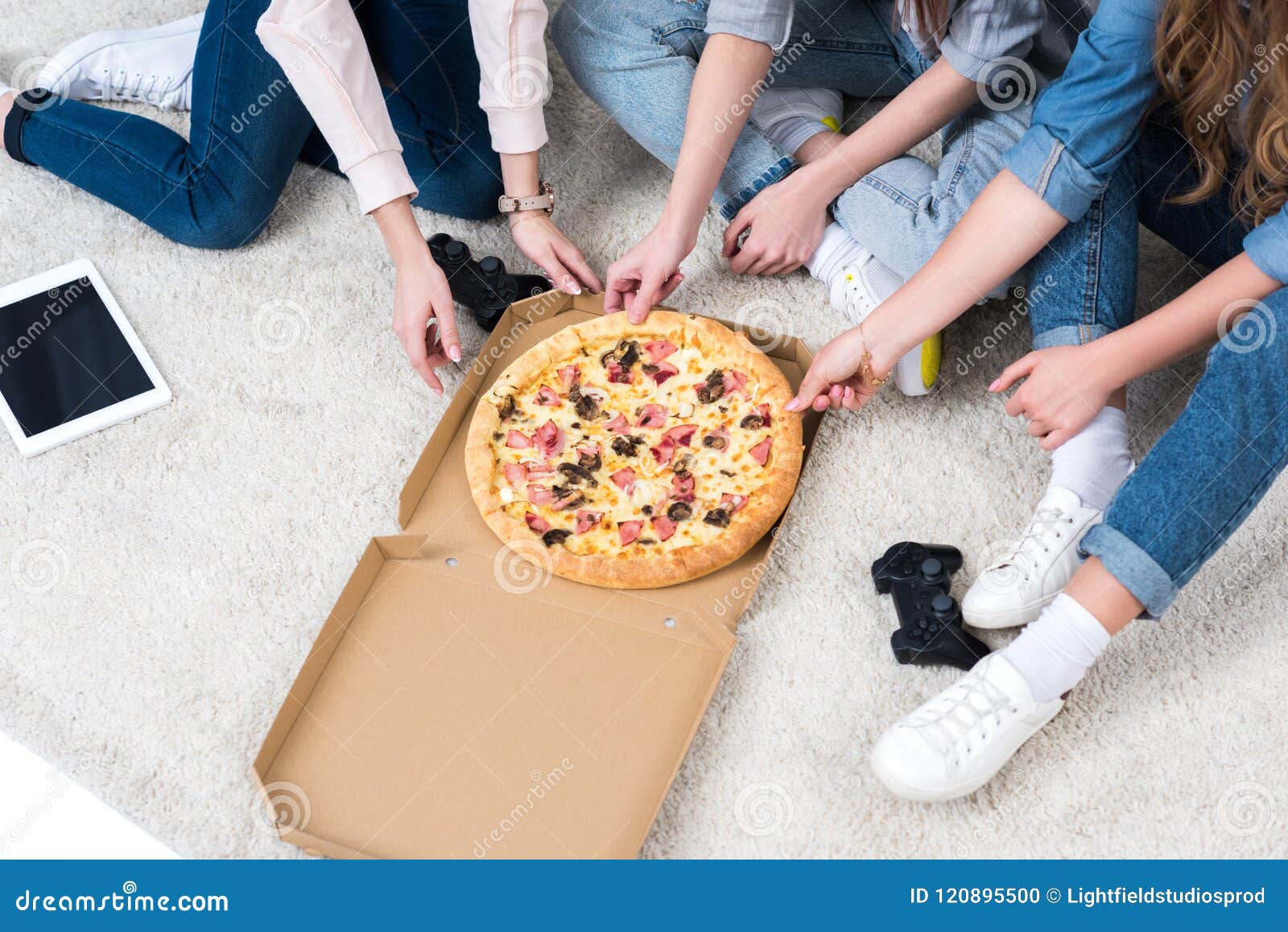 High Angle View of Girlfriends Eating Pizza Stock Photo - Image of ...