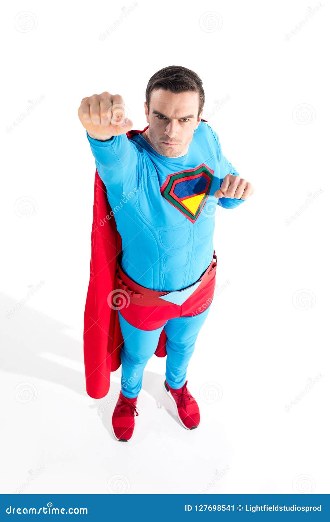 Handsome Superhero Showing Muscles And Looking At Camera Stock ...