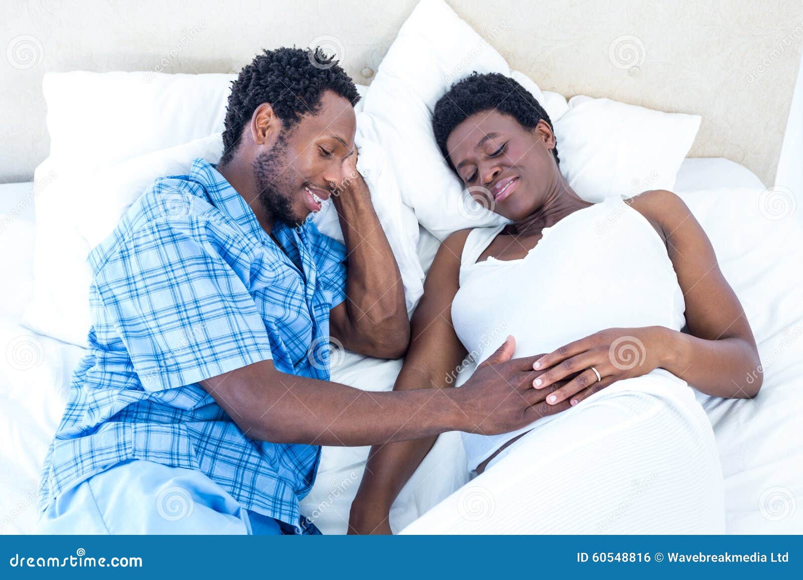 High Angle View of Husband and Wife Relaxing on Bed Stock Photo - Image ...